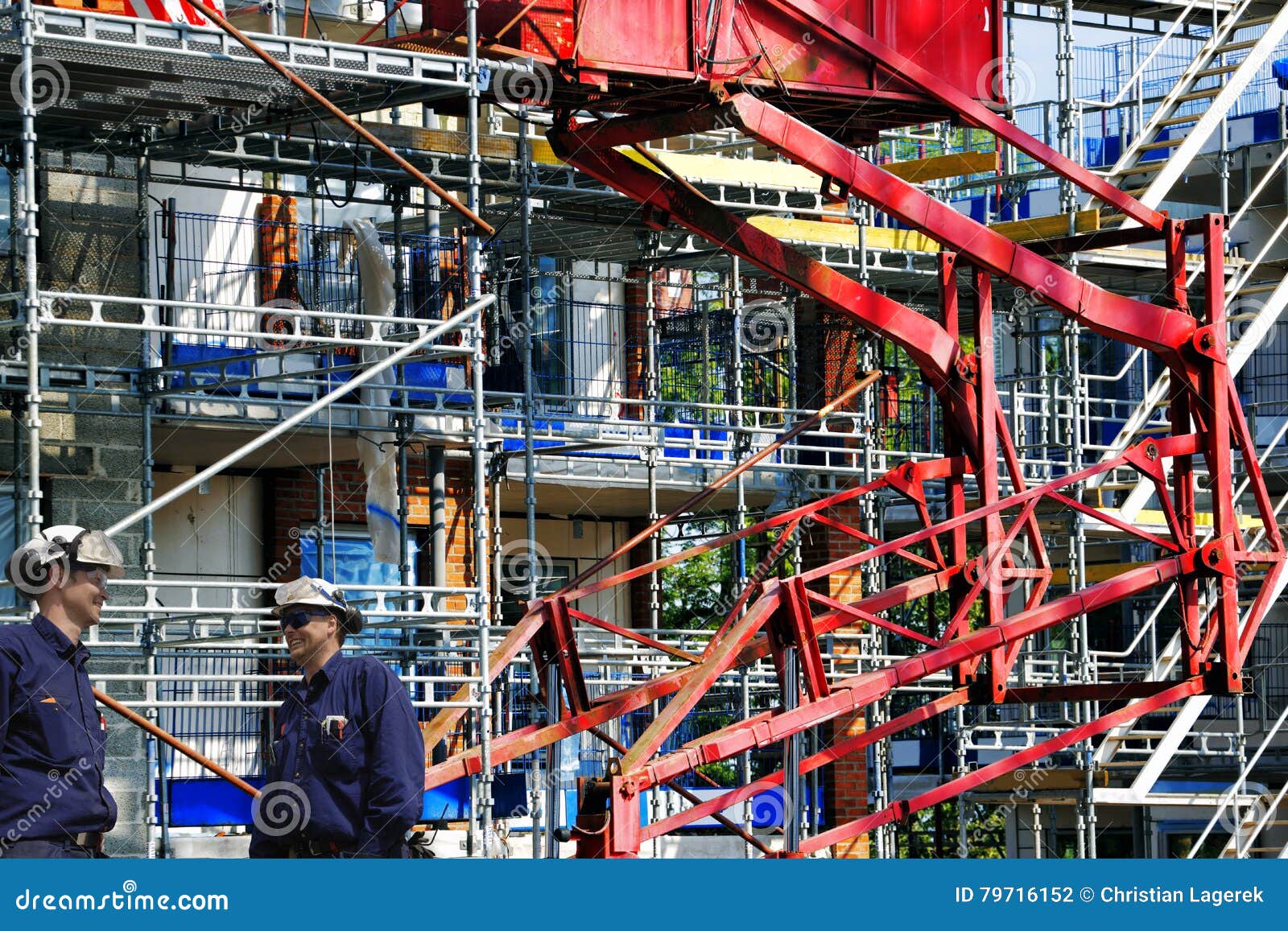 Construction Workers and Giant Building Site Stock Photo - Image of ...