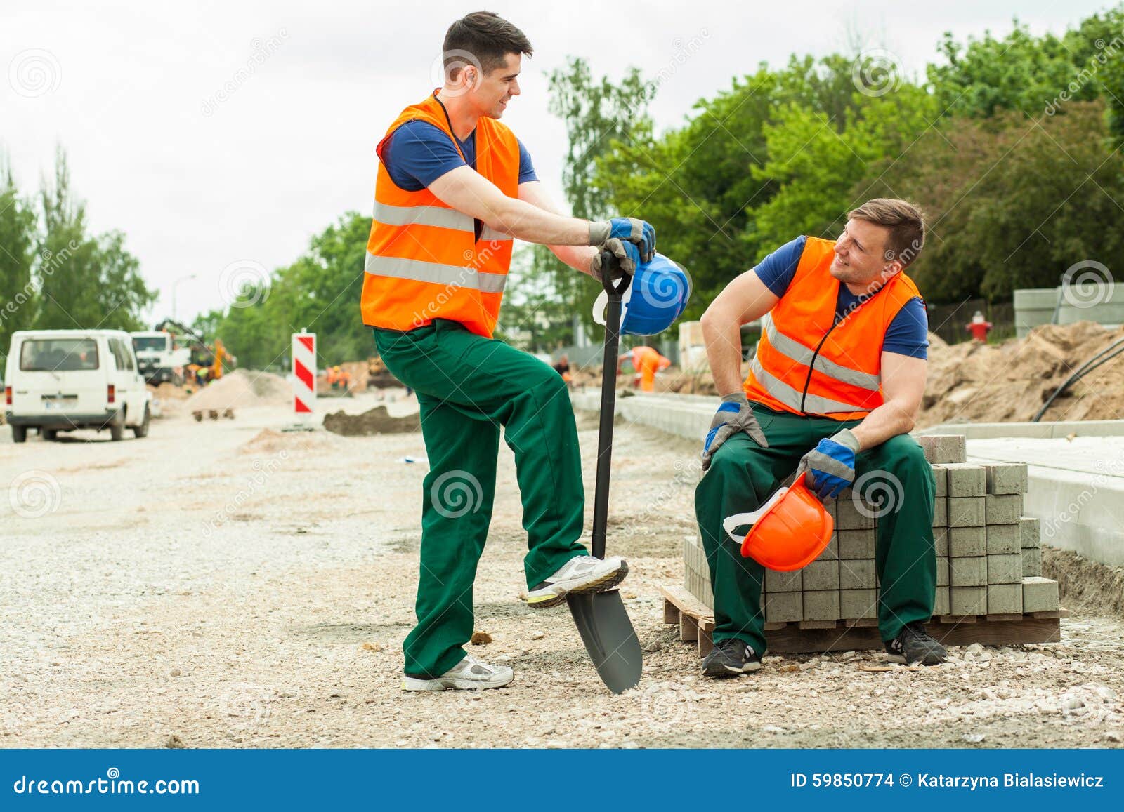 Construction Workers Having Break Stock Photo - Image of orange, break ...