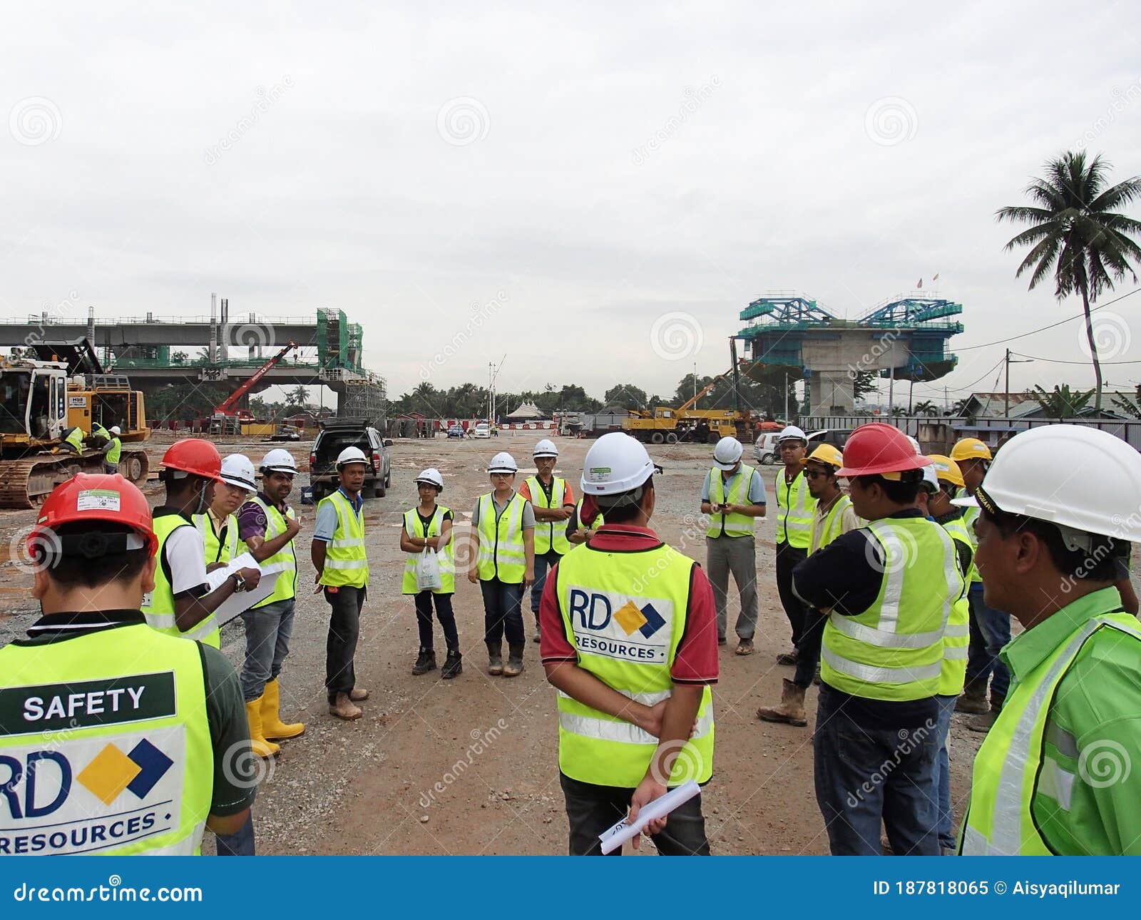 Construction Workers Having a Discussion at the Construction Site ...