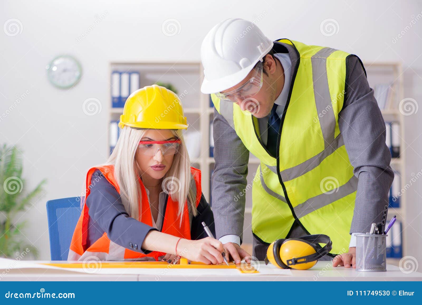 Construction Workers Having Discussion in Office before Starting Stock ...