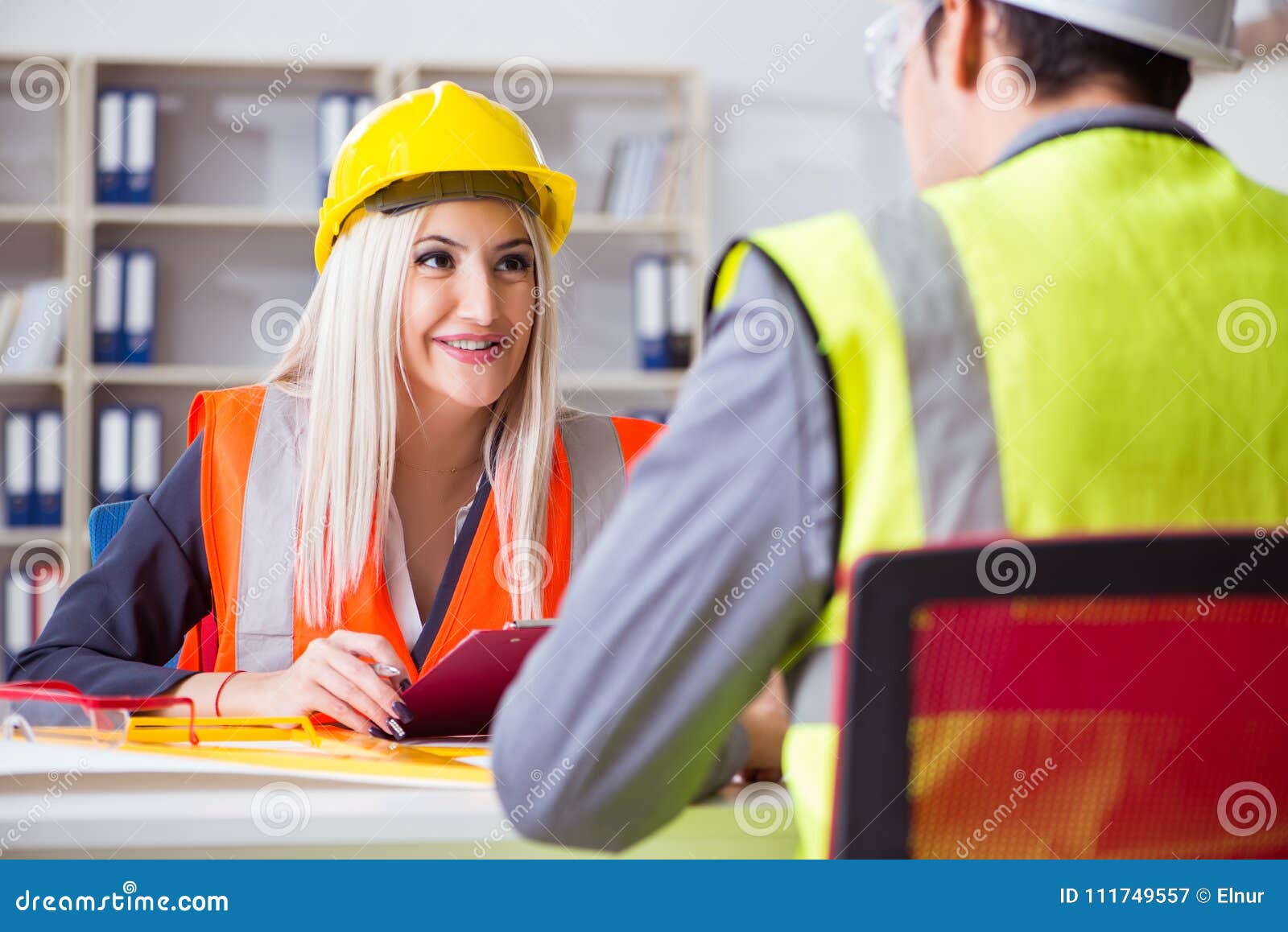 Construction Workers Having Discussion in Office before Starting Stock ...