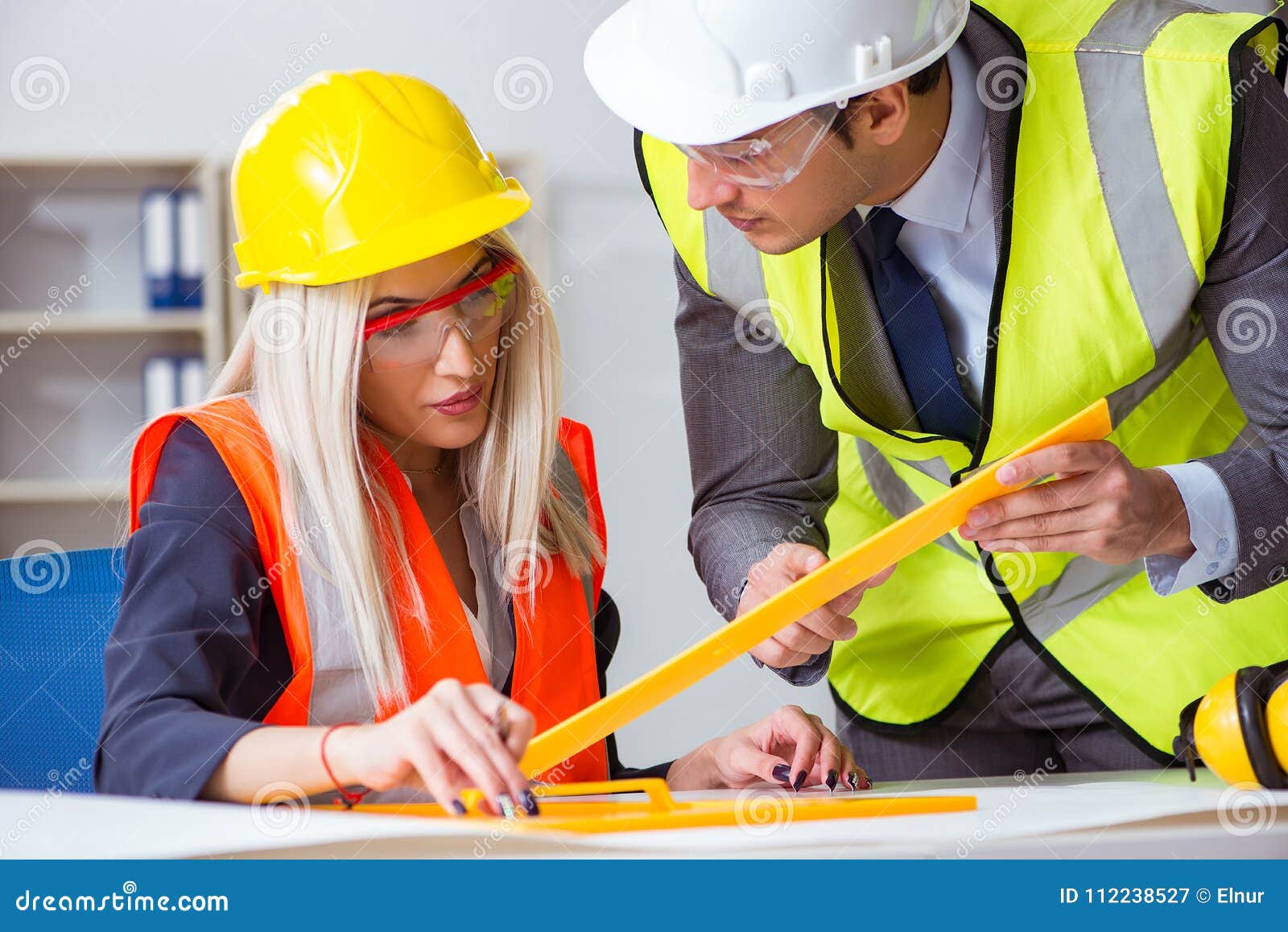 Construction Workers Having Discussion in Office before Starting Stock ...