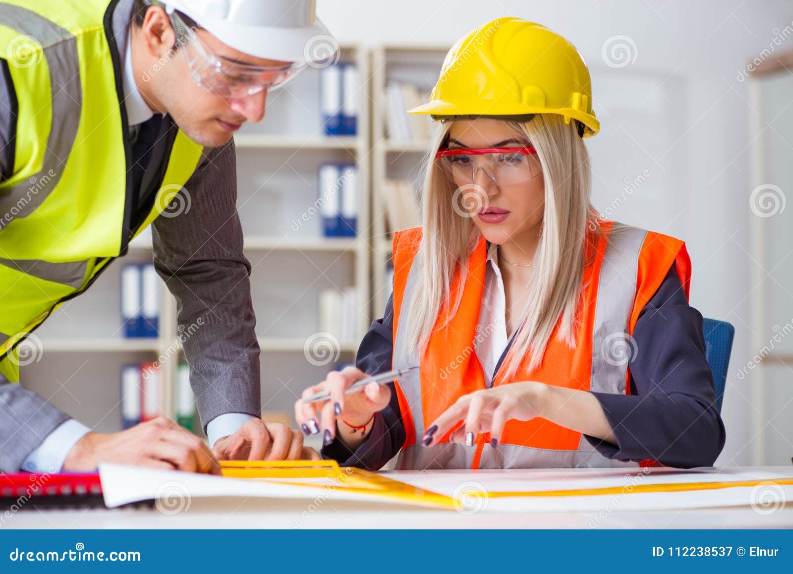 Construction Workers Having Discussion in Office before Starting Stock ...