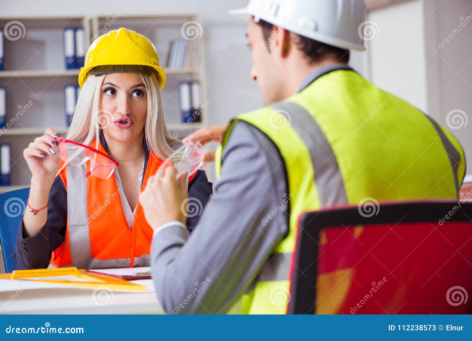 Construction Workers Having Discussion in Office before Starting Stock ...