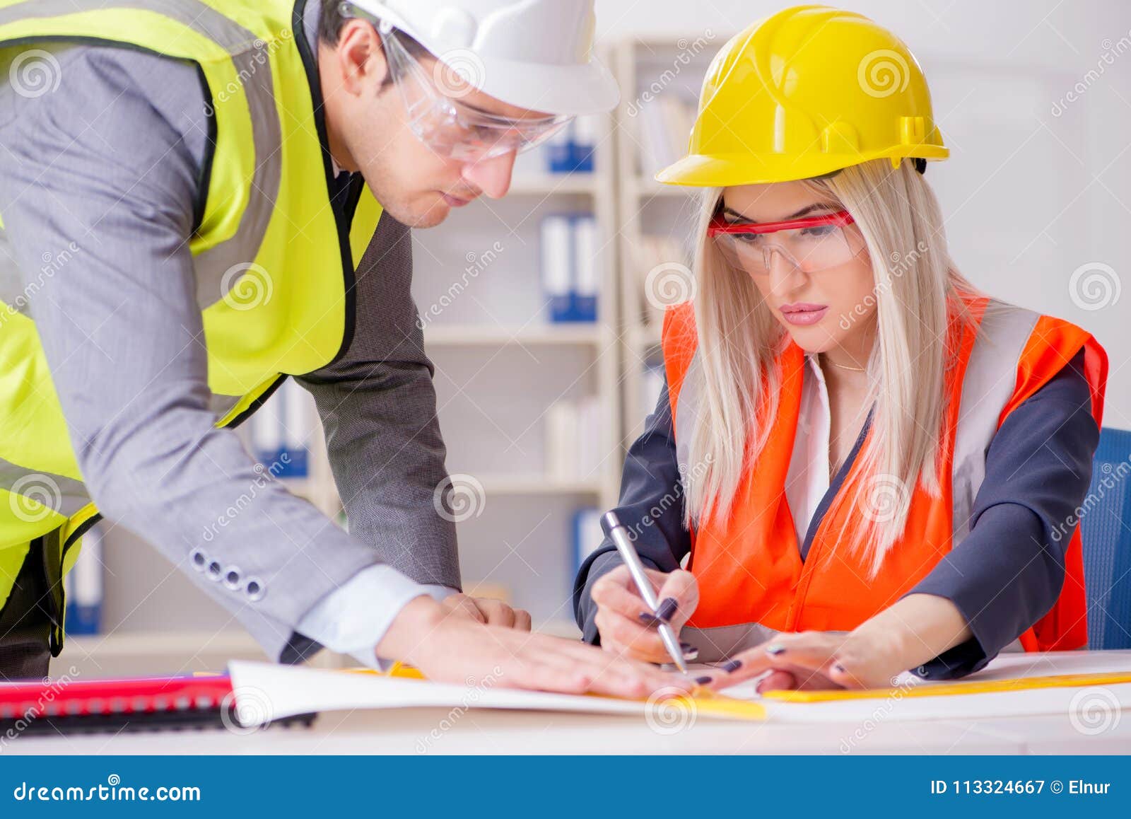 Construction Workers Having Discussion in Office before Starting Stock ...