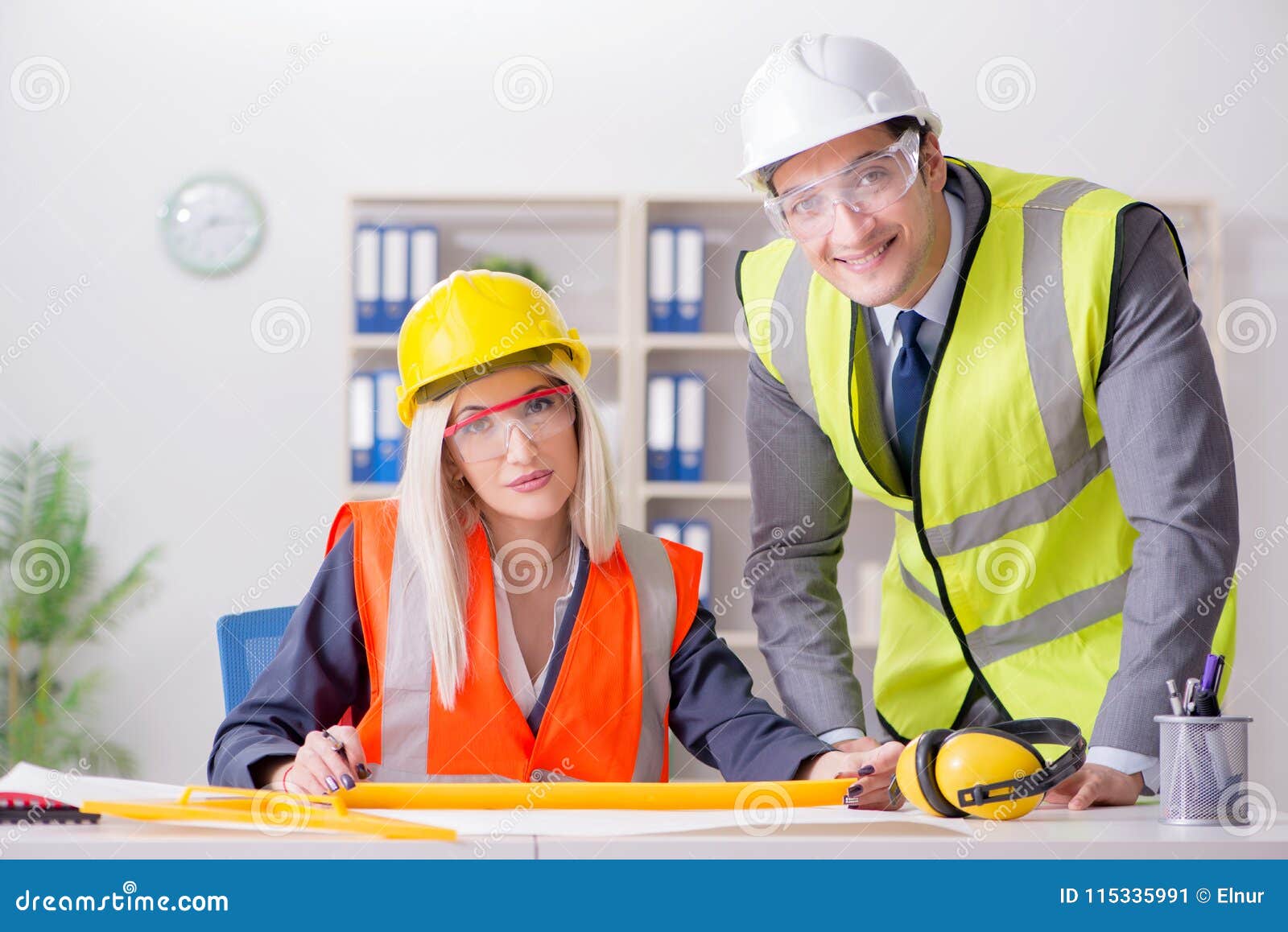 Construction Workers Having Discussion in Office before Starting Stock ...