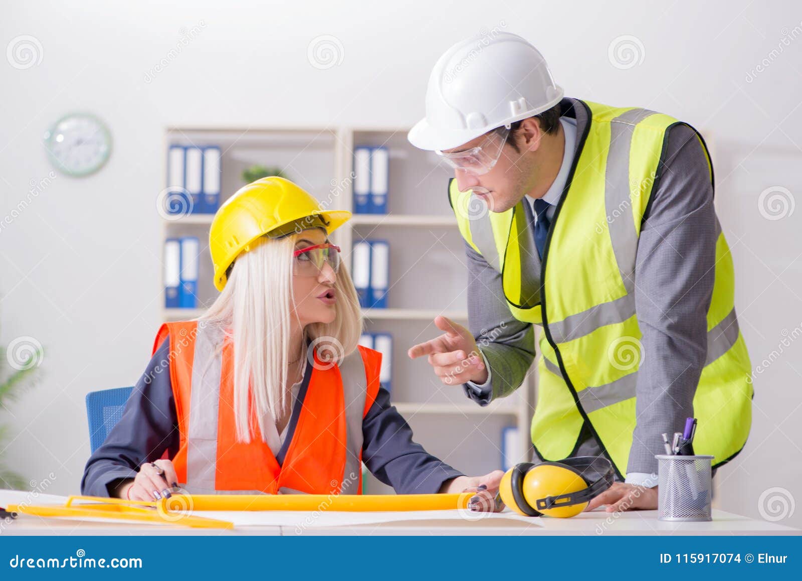 Construction Workers Having Discussion in Office before Starting Stock ...