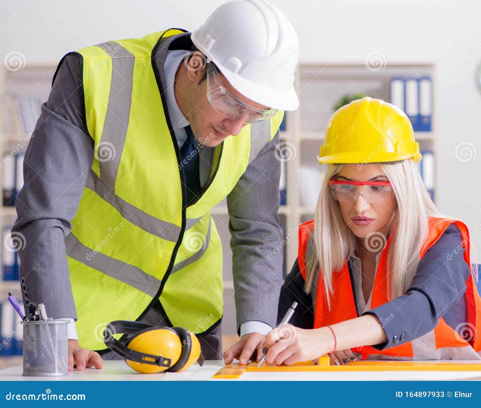 Construction Workers Having Discussion in Office before Starting Stock ...