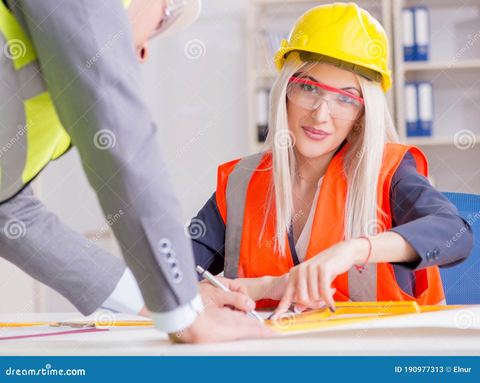 Construction Workers Having Discussion in Office before Starting Stock ...