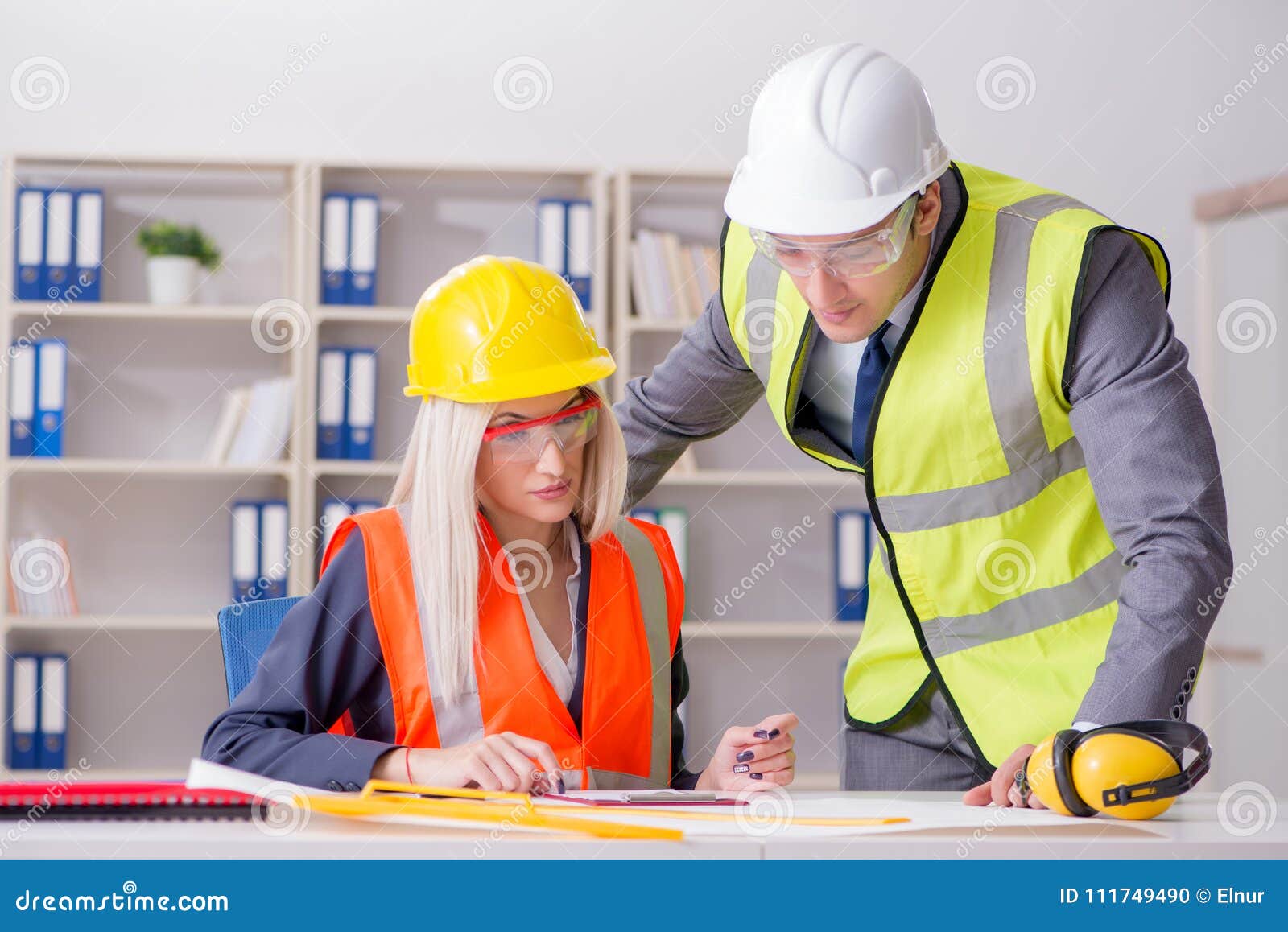 Construction Workers Having Discussion in Office before Starting Stock ...