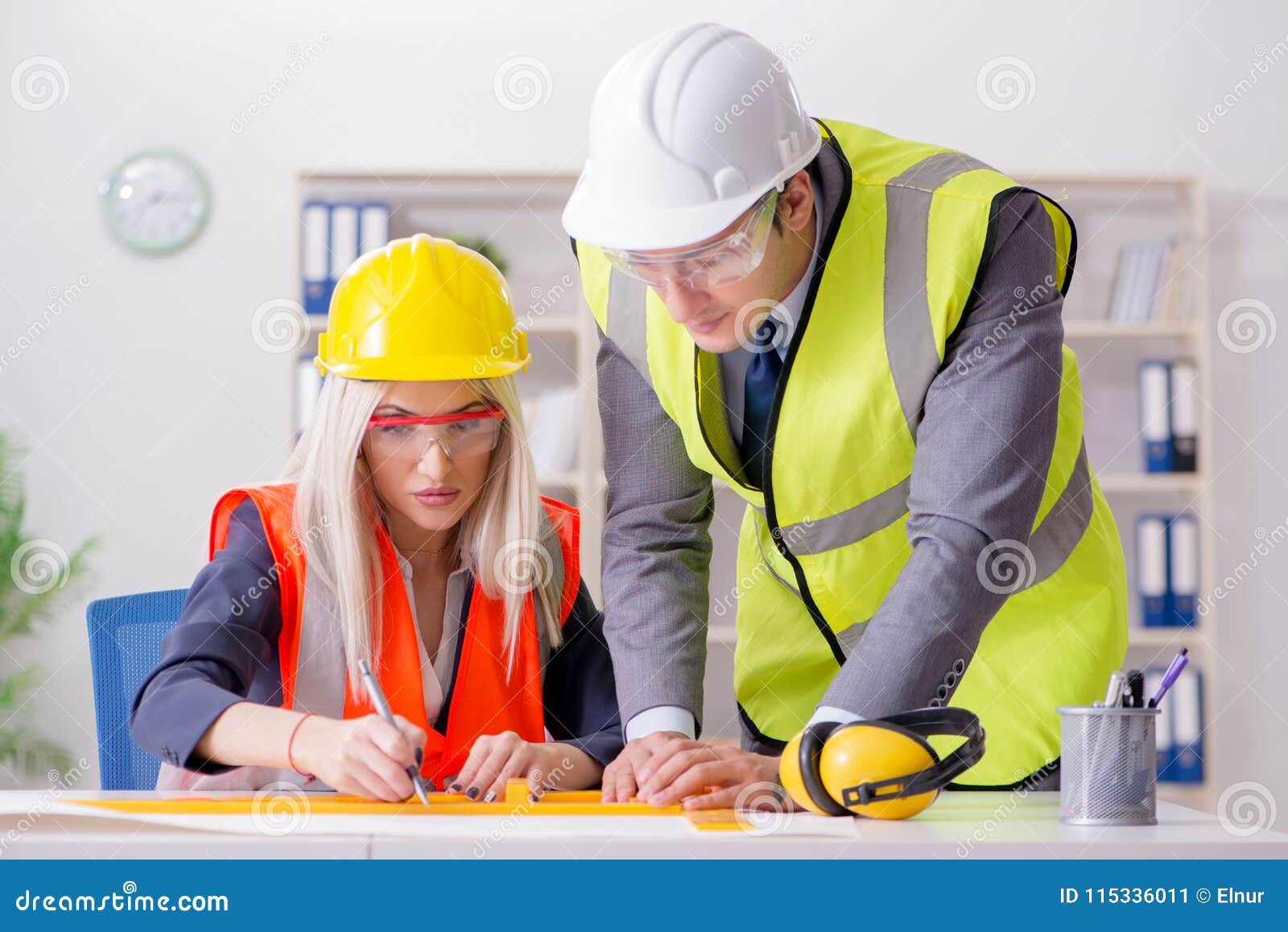 Construction Workers Having Discussion in Office before Starting Stock ...