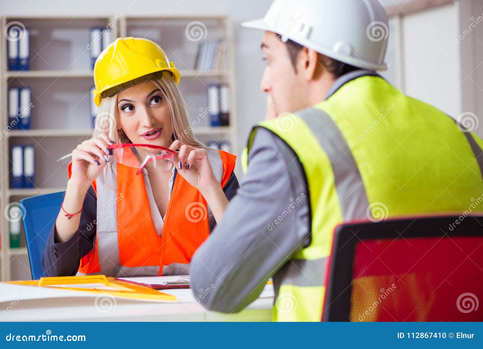 Construction Workers Having Discussion in Office before Starting Stock ...