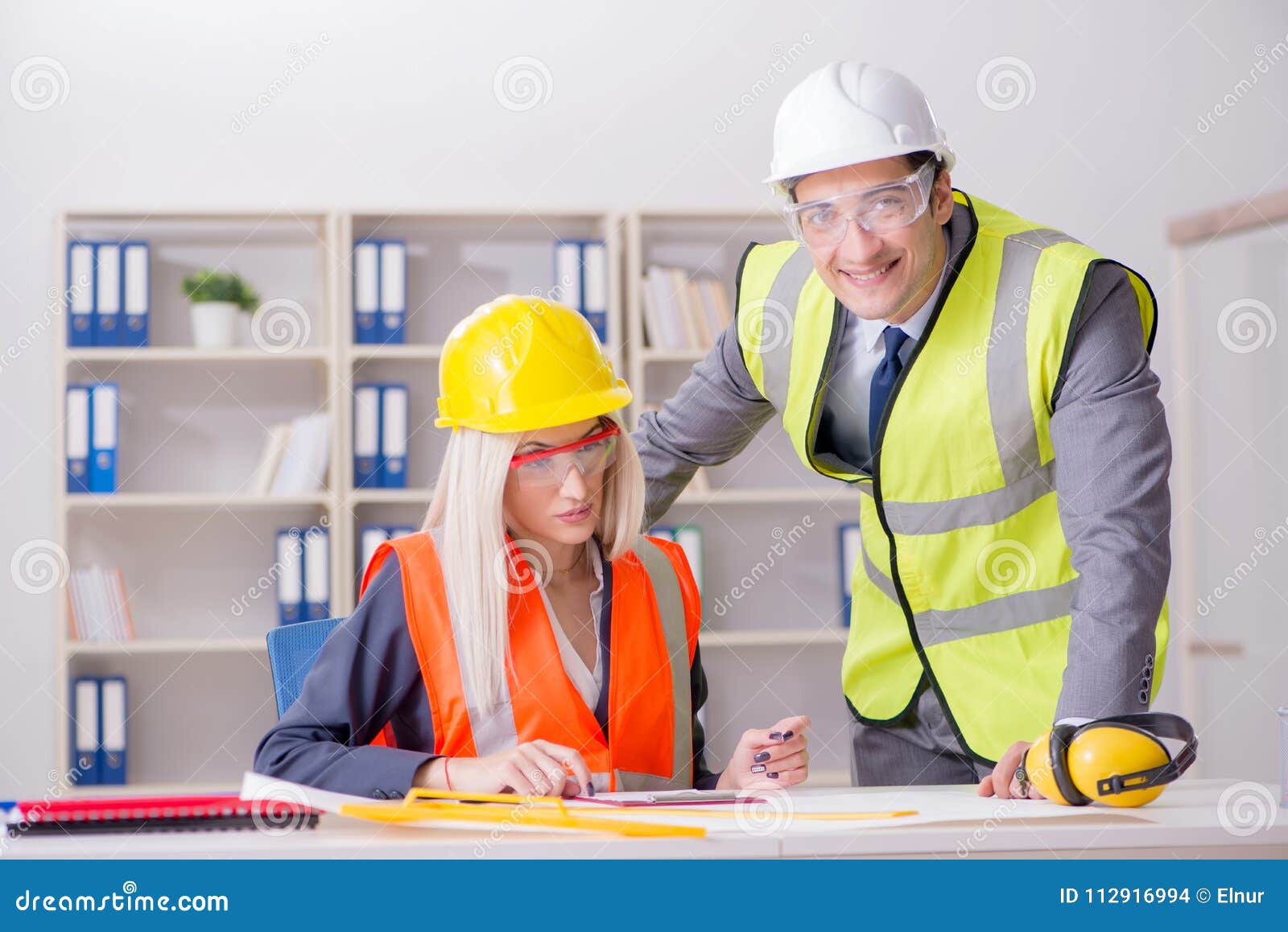 Construction Workers Having Discussion in Office before Starting Stock ...