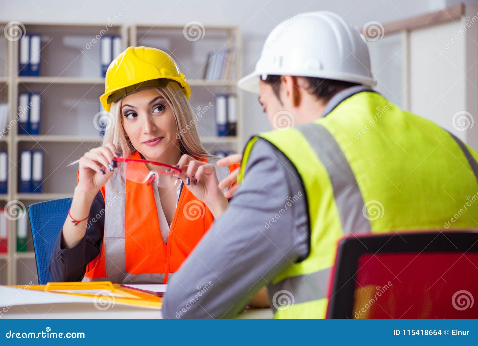 Construction Workers Having Discussion in Office before Starting Stock ...