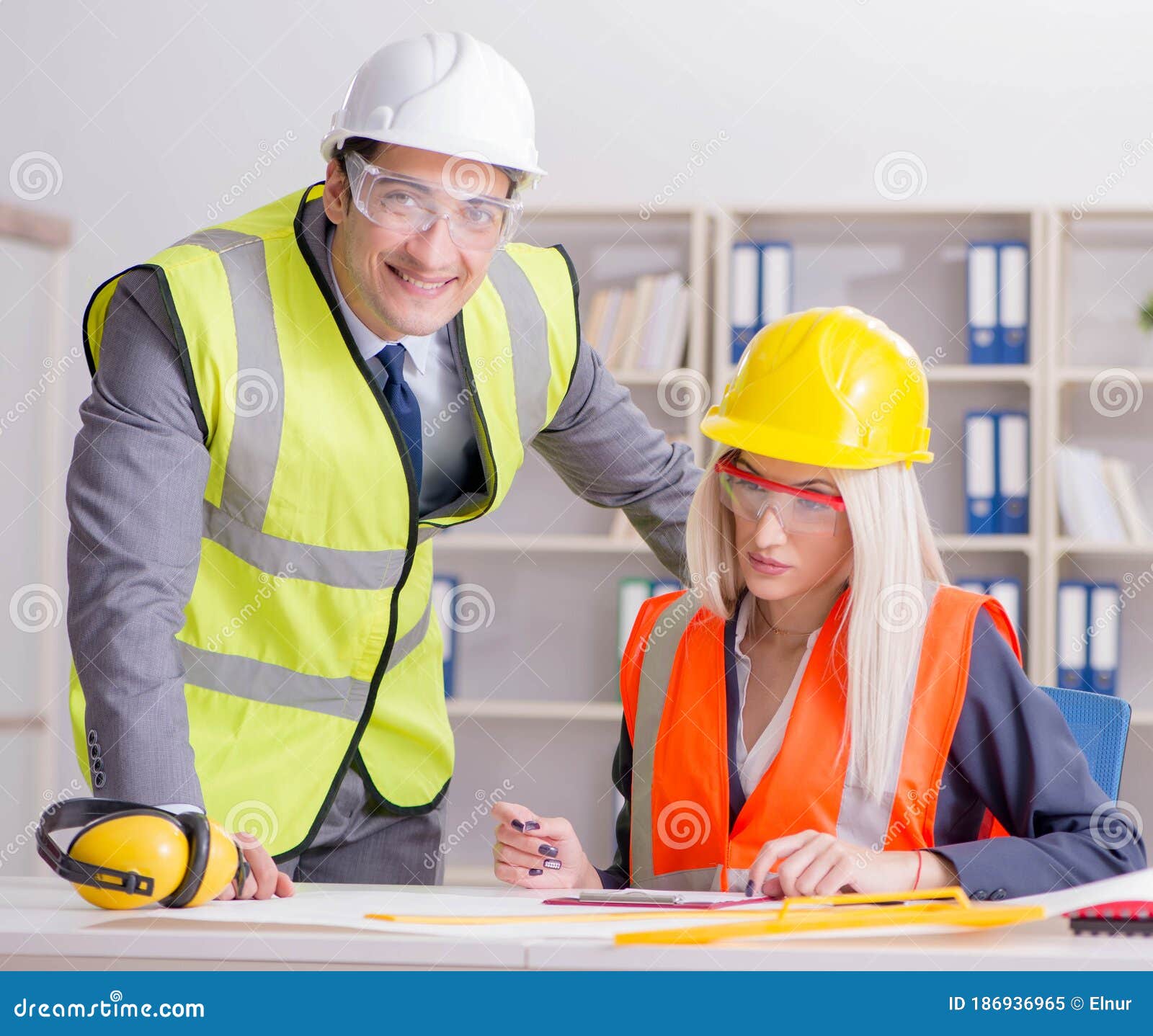 Construction Workers Having Discussion in Office before Starting Stock ...