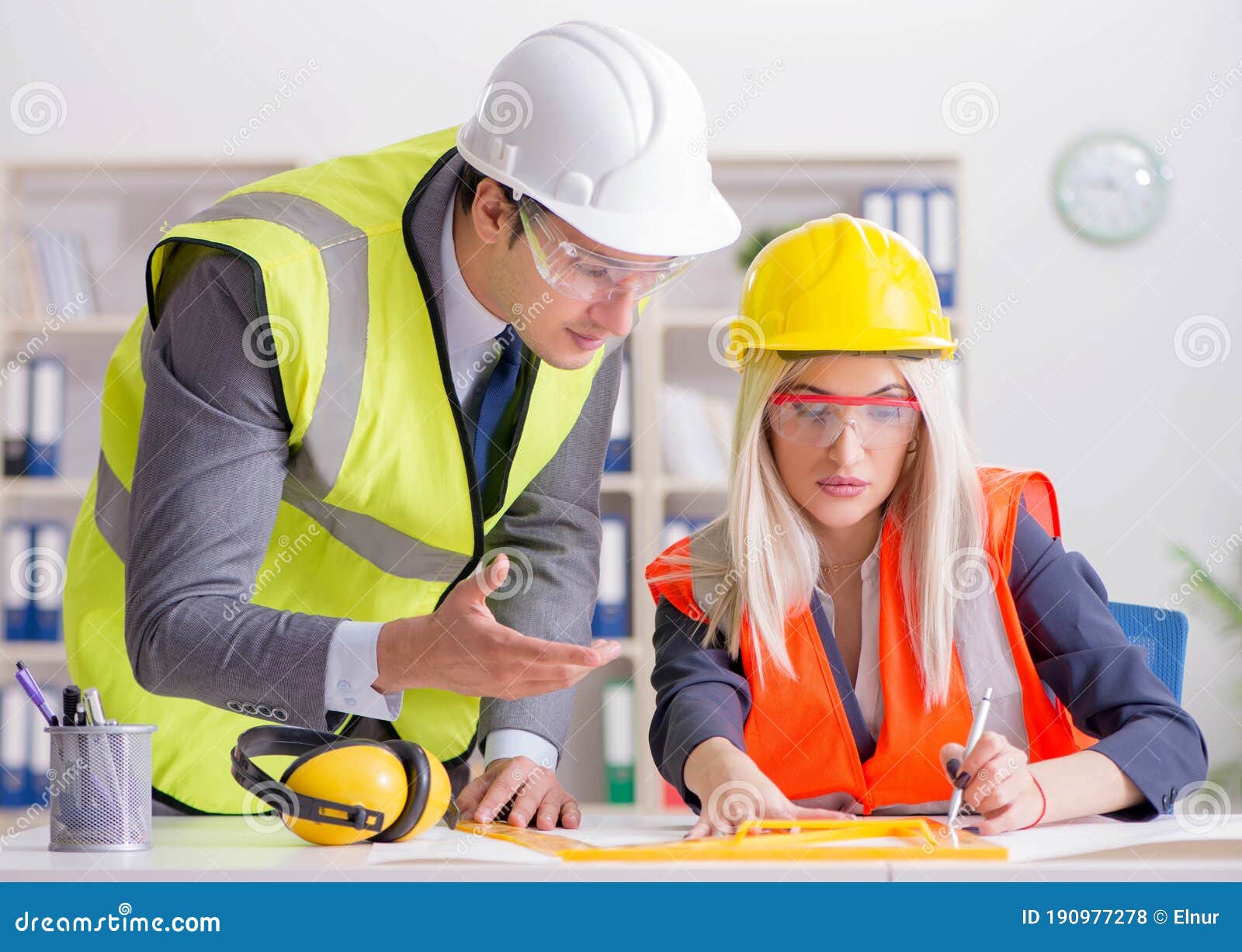Construction Workers Having Discussion in Office before Starting Stock ...