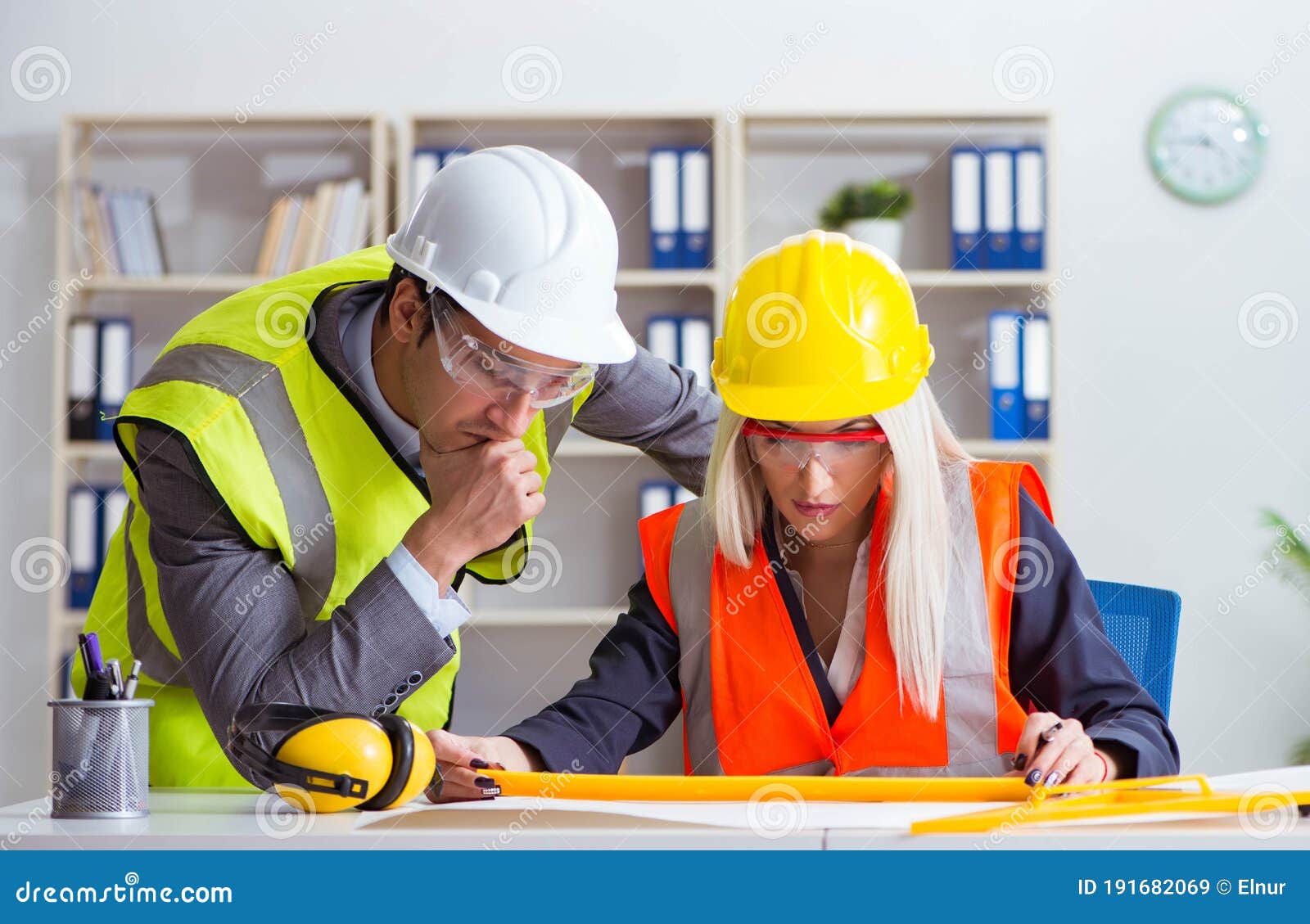 Construction Workers Having Discussion in Office before Starting Stock ...