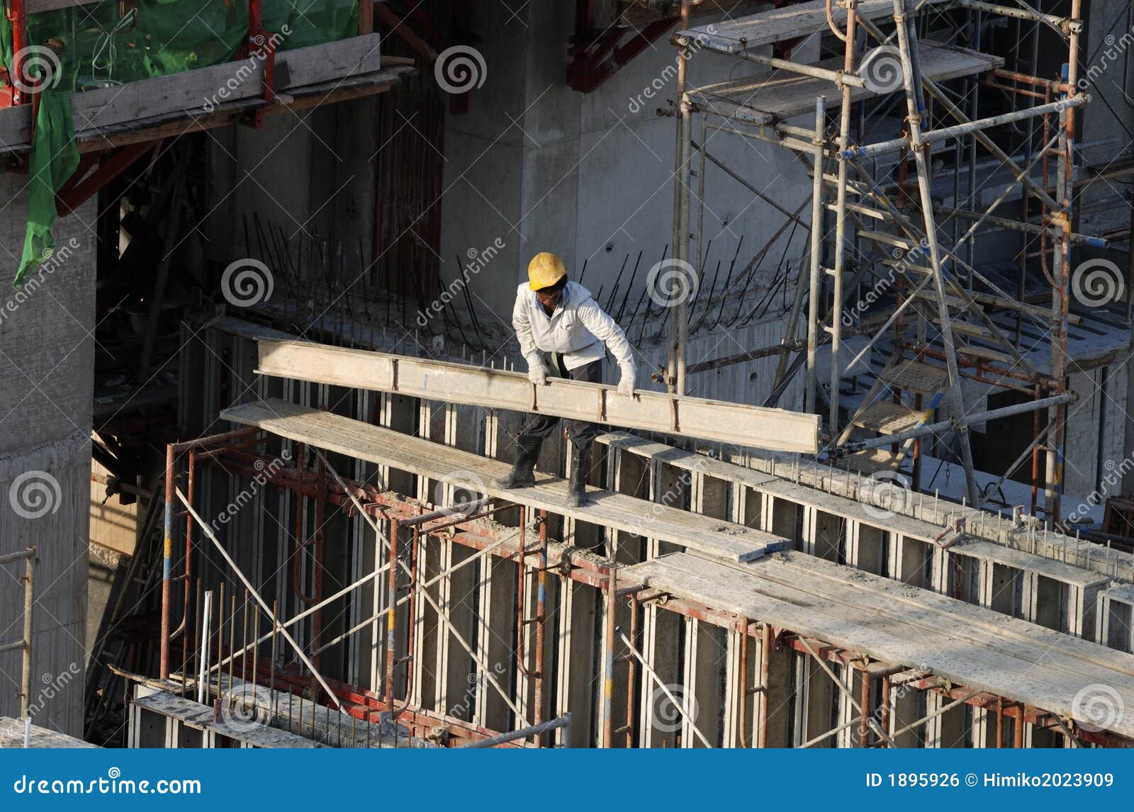 Construction Workers at High-rise Building Stock Photo - Image of ...