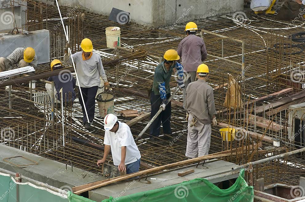 Construction Workers at High-rise Building Stock Photo - Image of ...