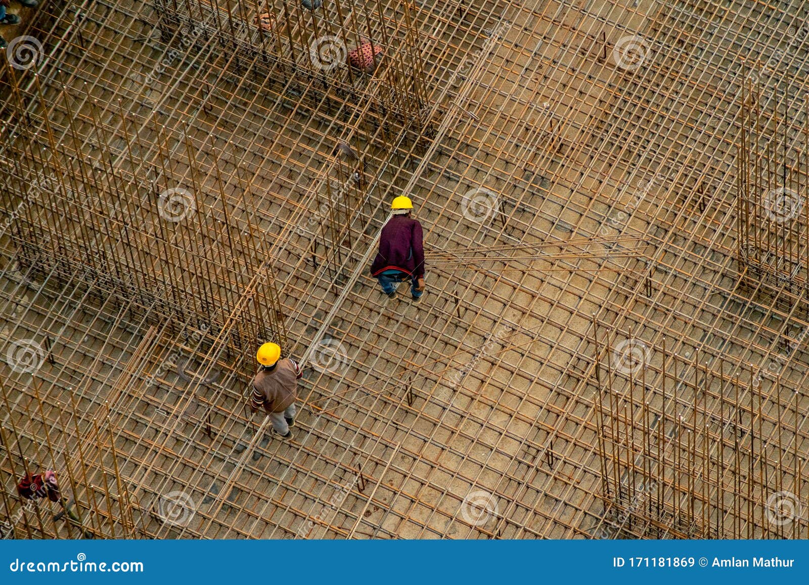 Construction Workers in India Standing on a Rebar Reinforcing Bar ...