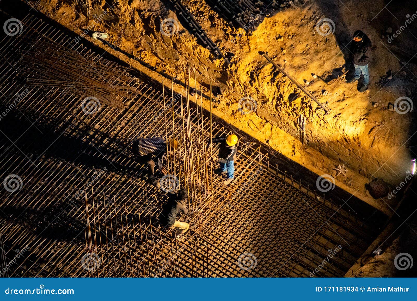 Construction Workers in India Standing on a Rebar Reinforcing Bar ...