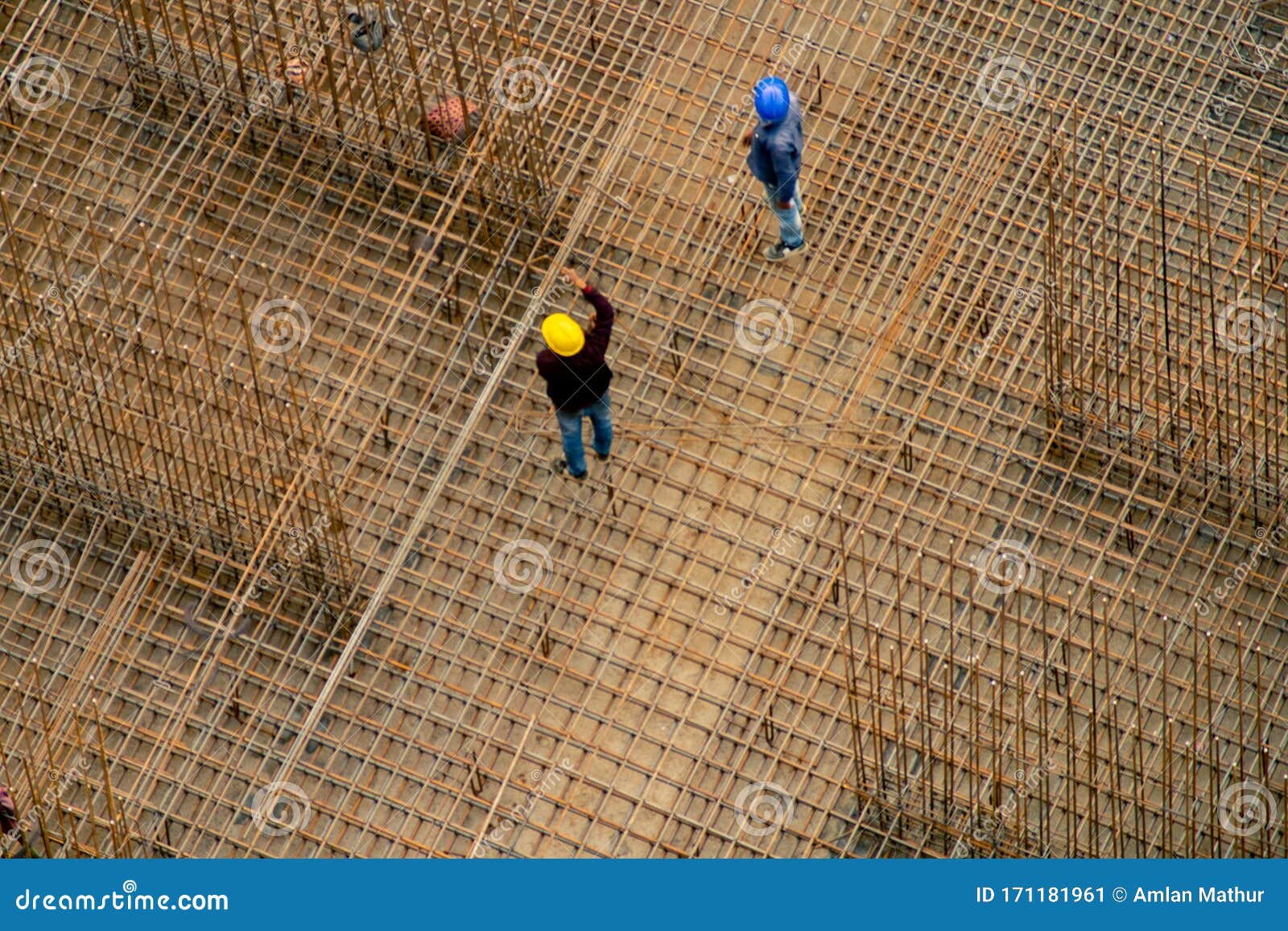 Construction Workers in India Standing on a Rebar Reinforcing Bar ...