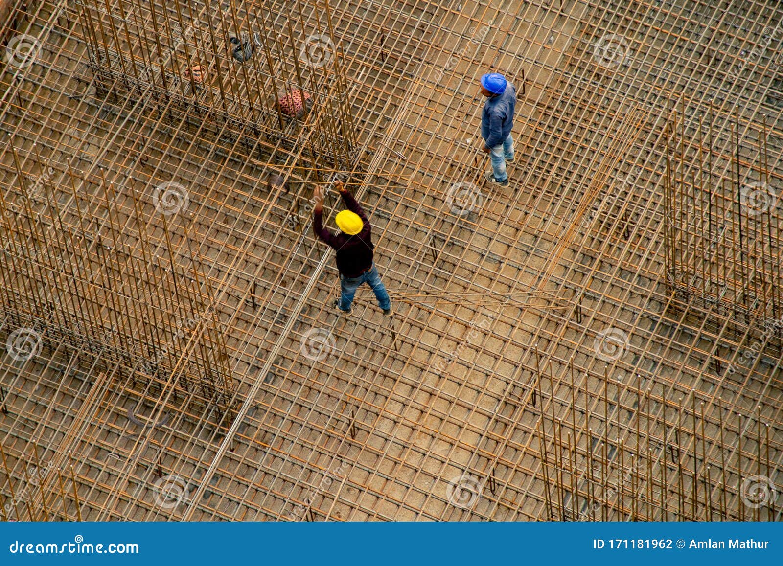 Construction Workers in India Standing on a Rebar Reinforcing Bar ...