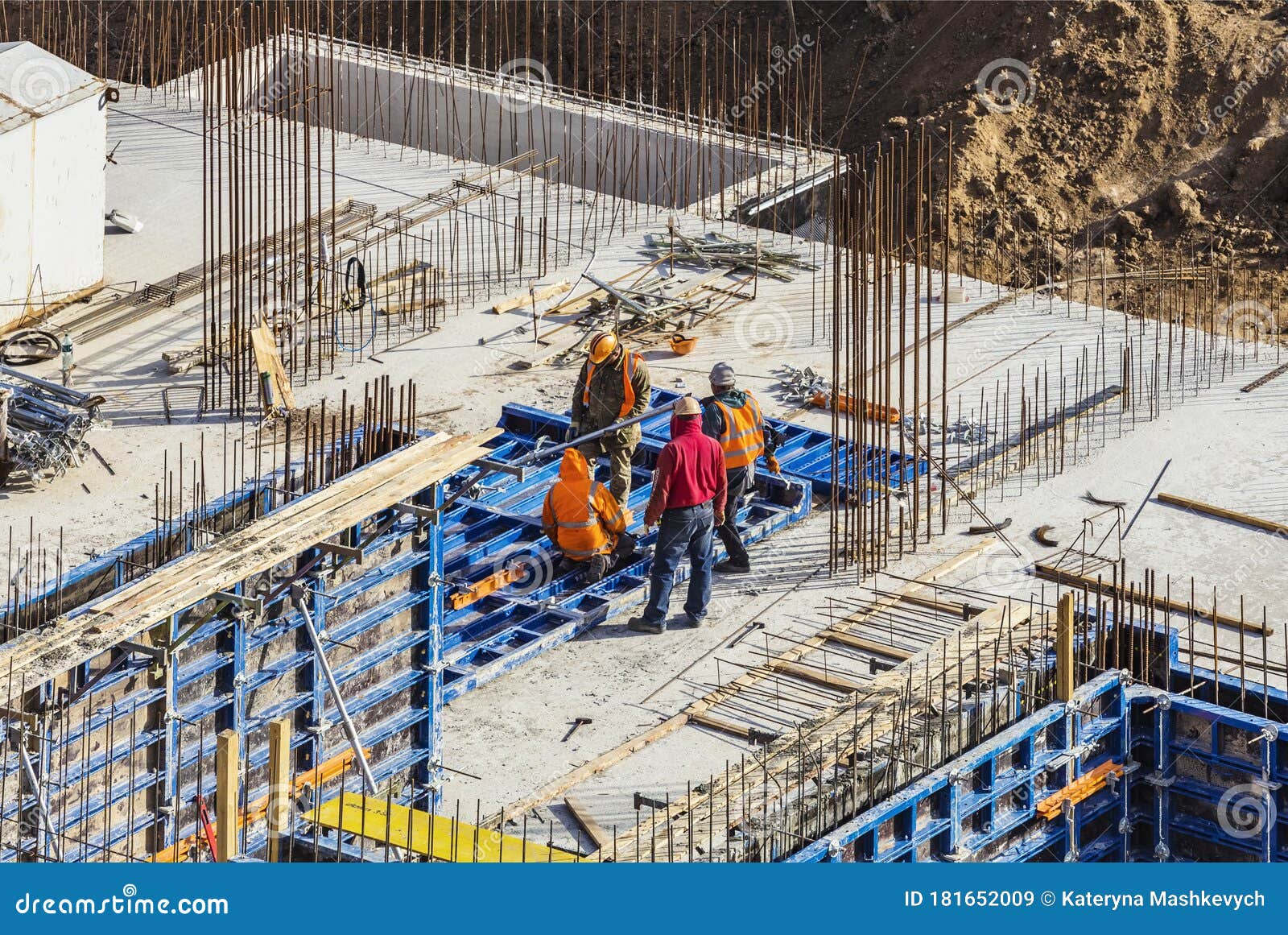 Construction Workers Install Formwork and Iron Rebars or Reinforcing ...