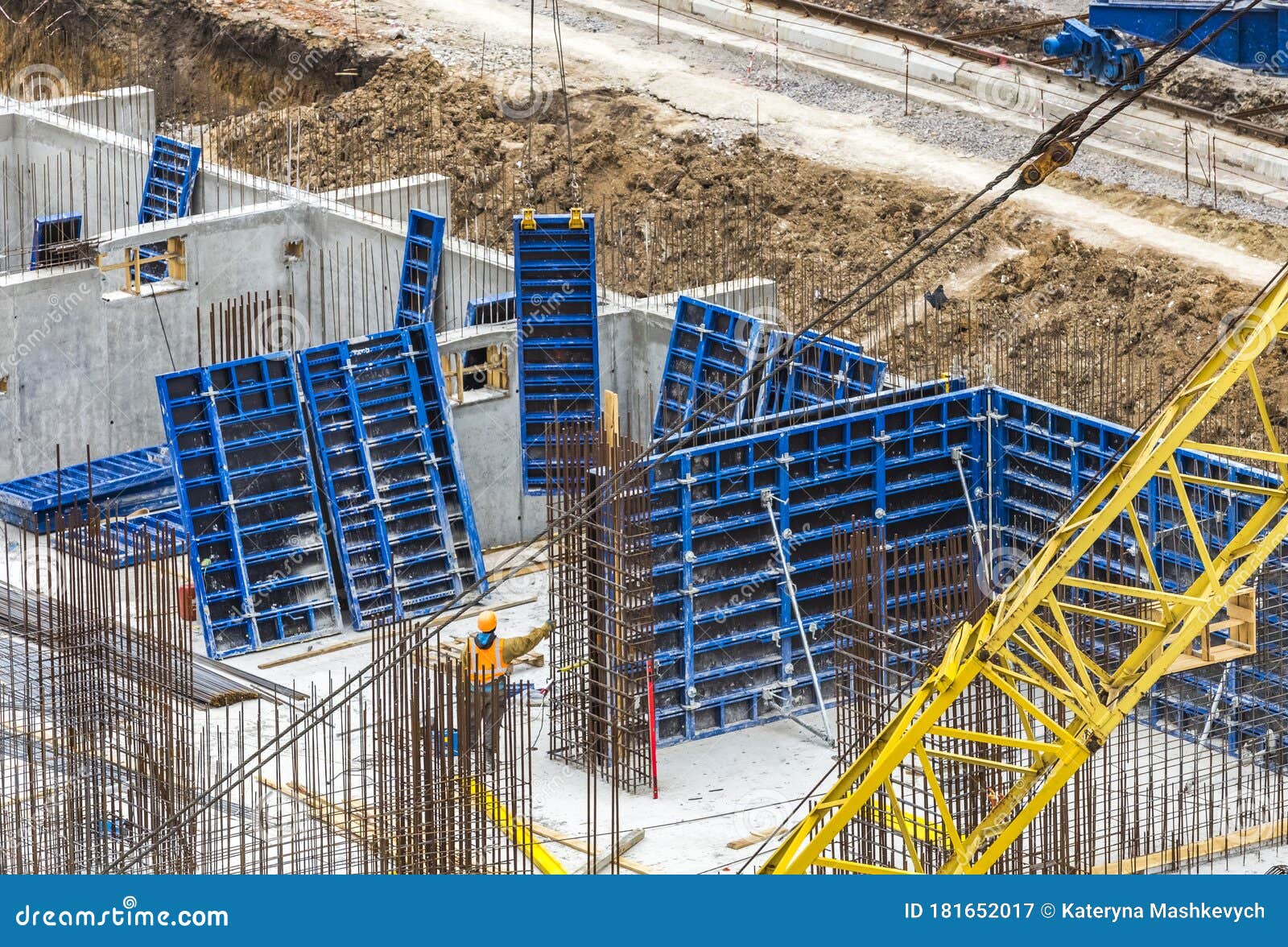 Construction Workers Install Formwork and Iron Rebars or Reinforcing ...