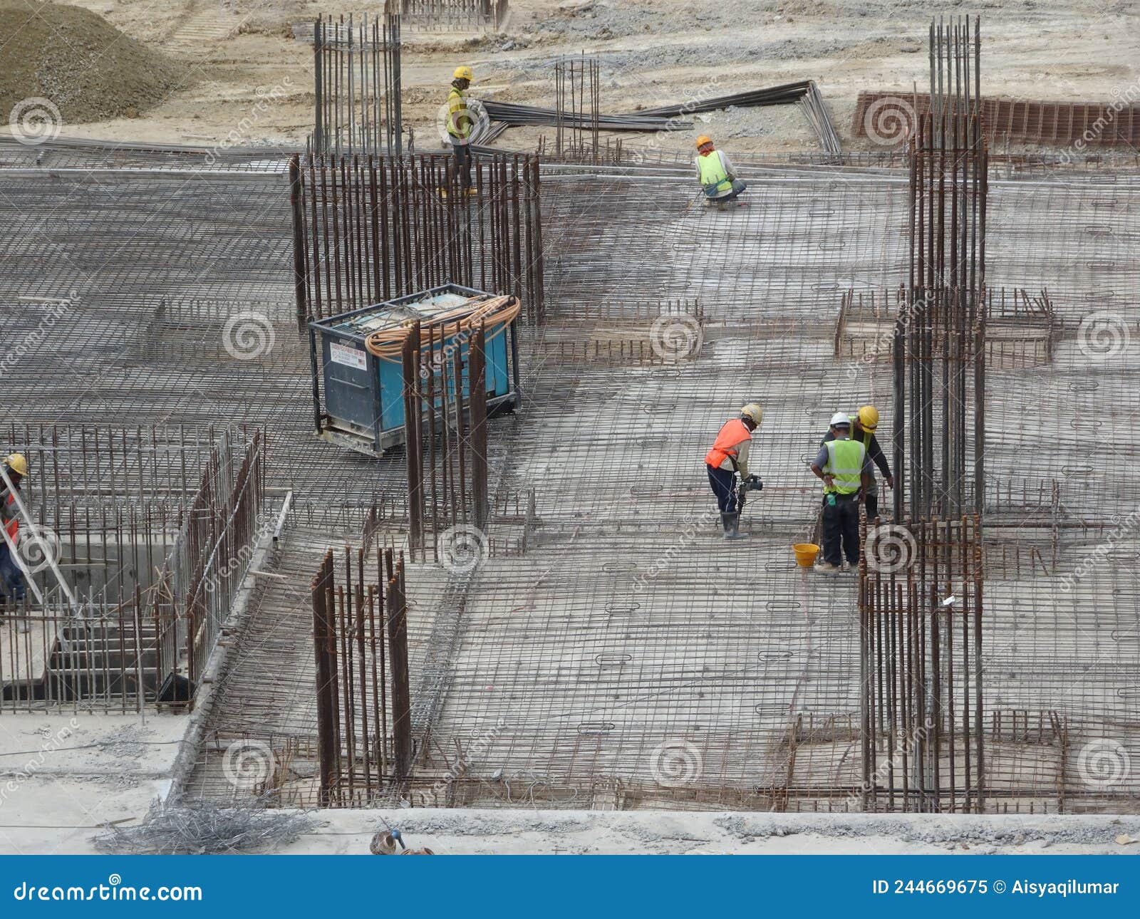 Construction Workers Install Reinforcement Bars at the Construction ...