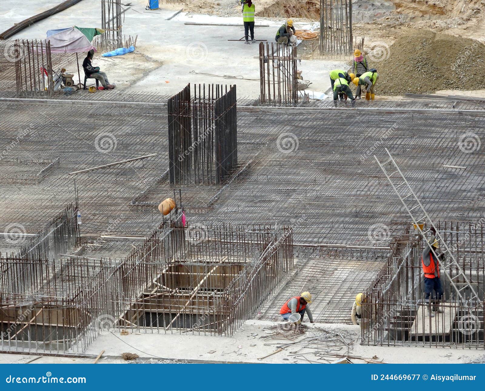 Construction Workers Install Reinforcement Bars at the Construction ...