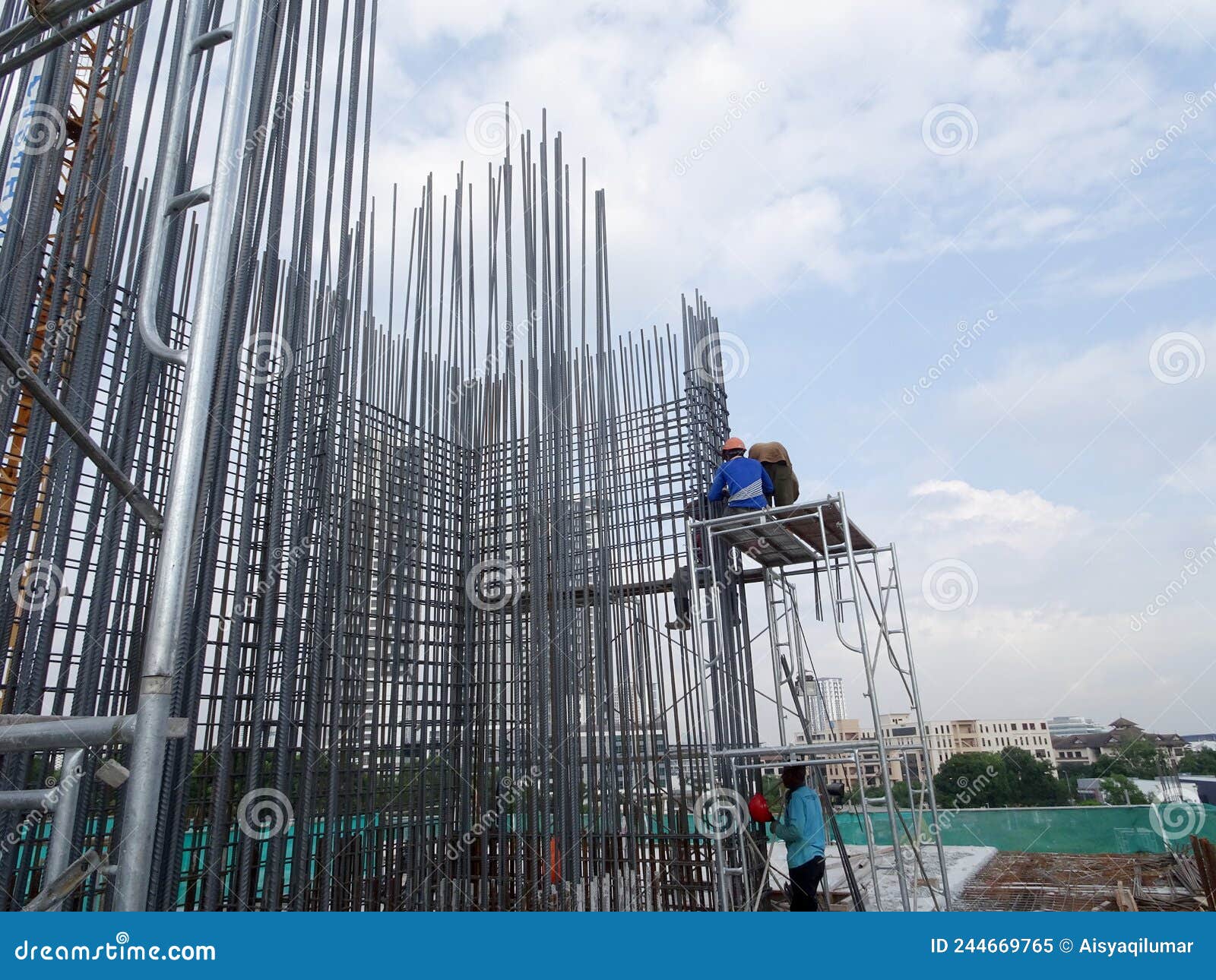 Construction Workers Install Reinforcement Bars at the Construction ...