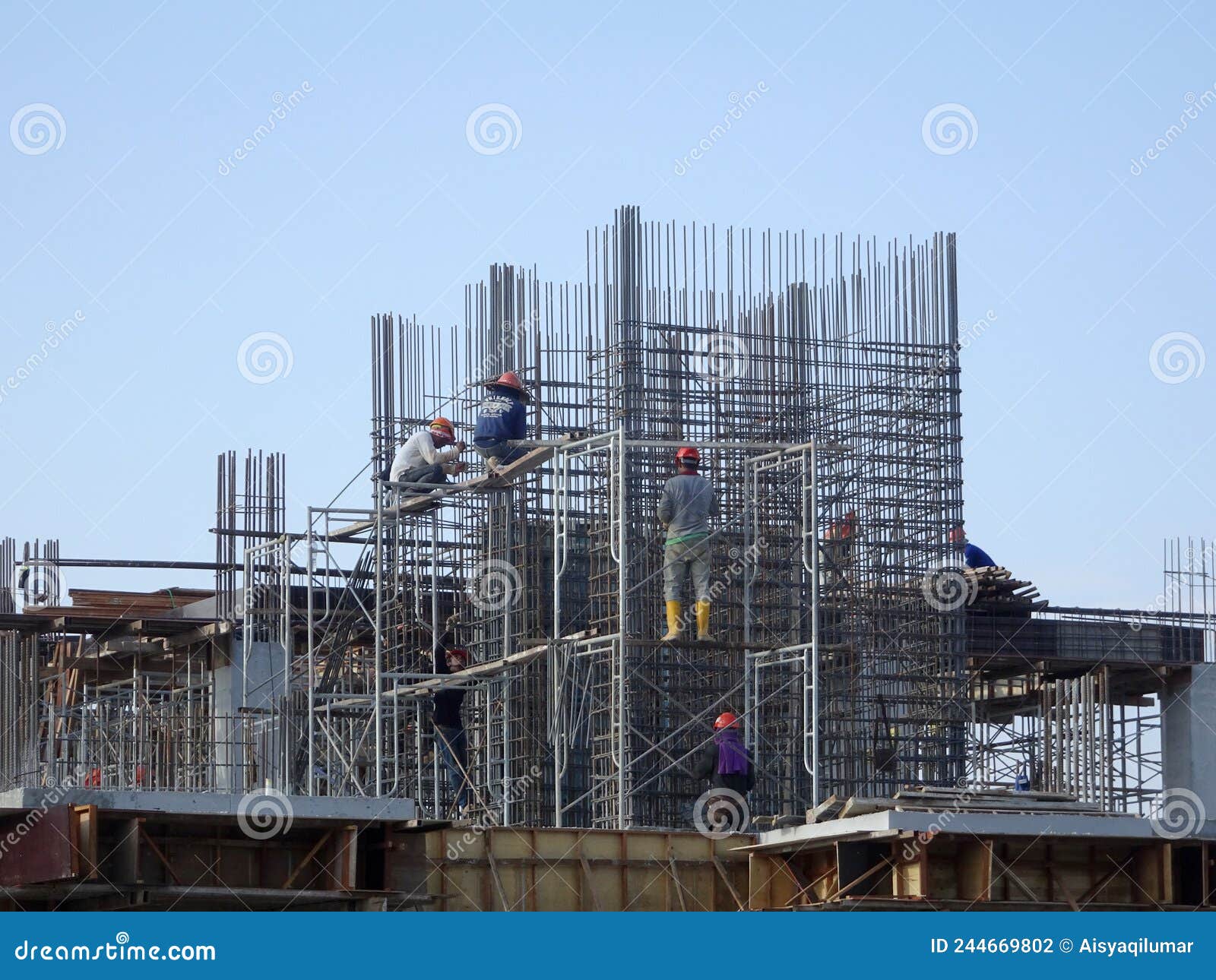 Construction Workers Install Reinforcement Bars at the Construction ...