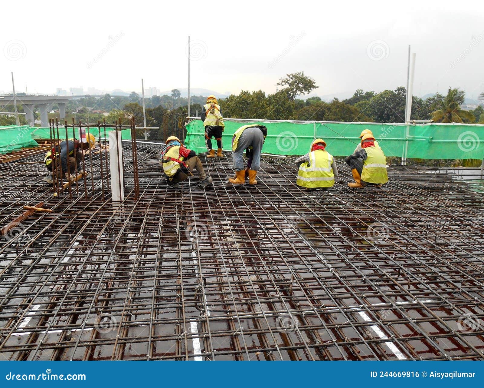 Construction Workers Install Reinforcement Bars at the Construction ...