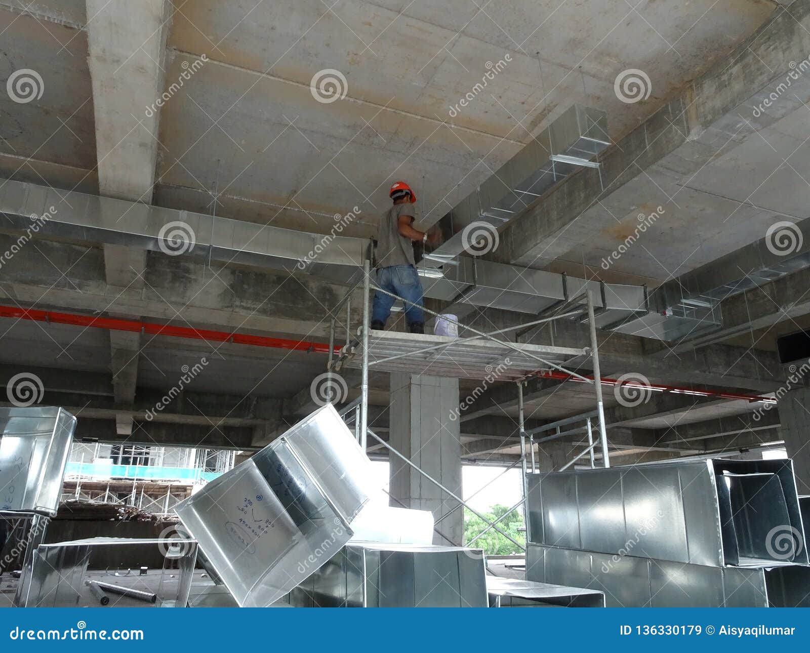 Construction Workers Installing Air Conditioning Duct Editorial Stock ...