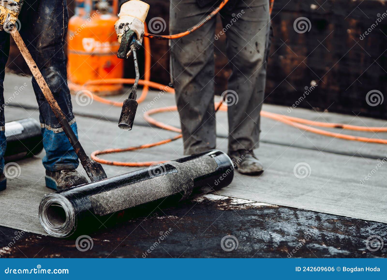Construction Workers Installing Bituminous Membrane Waterproofing ...