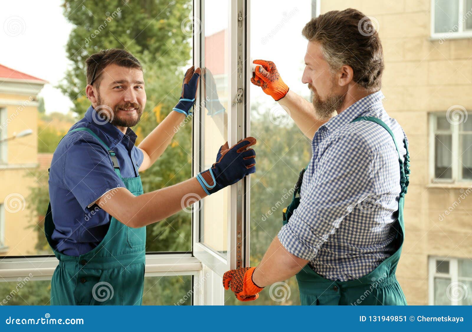 Construction Workers Installing New Window Stock Image - Image of ...
