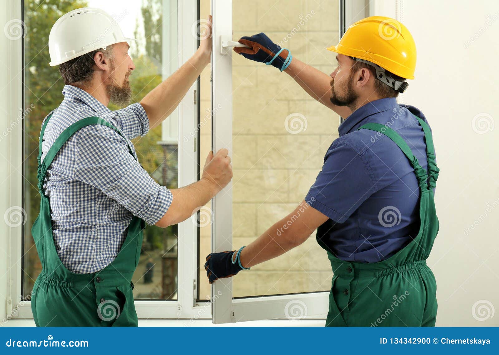 Construction Workers Installing New Window Stock Photo - Image of ...