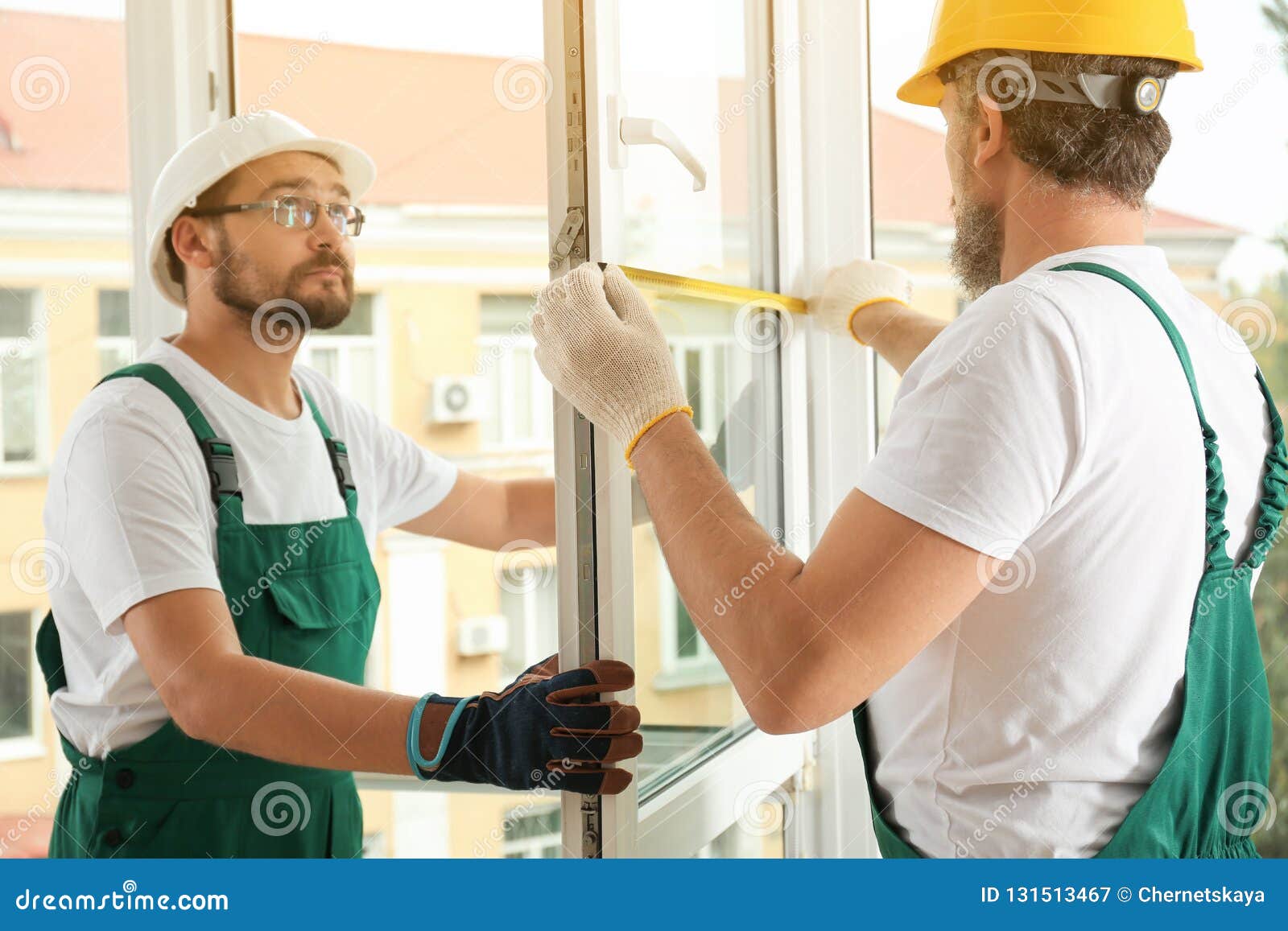 Construction Workers Installing New Window Stock Image - Image of ...