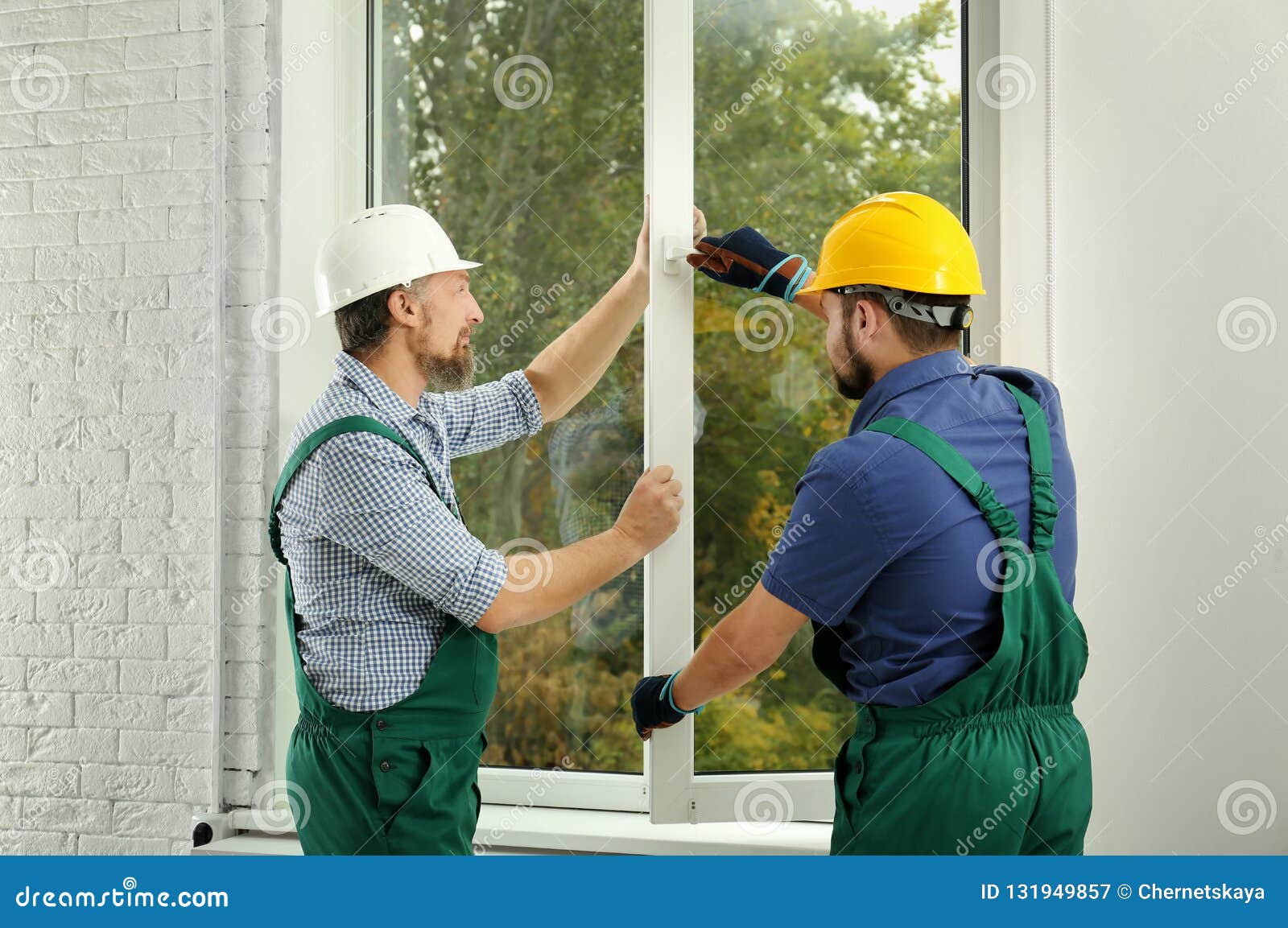 Construction Workers Installing New Window Stock Image - Image of ...