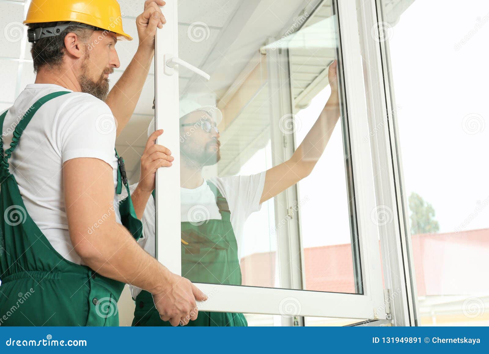 Construction Workers Installing New Window Stock Image - Image of glass ...