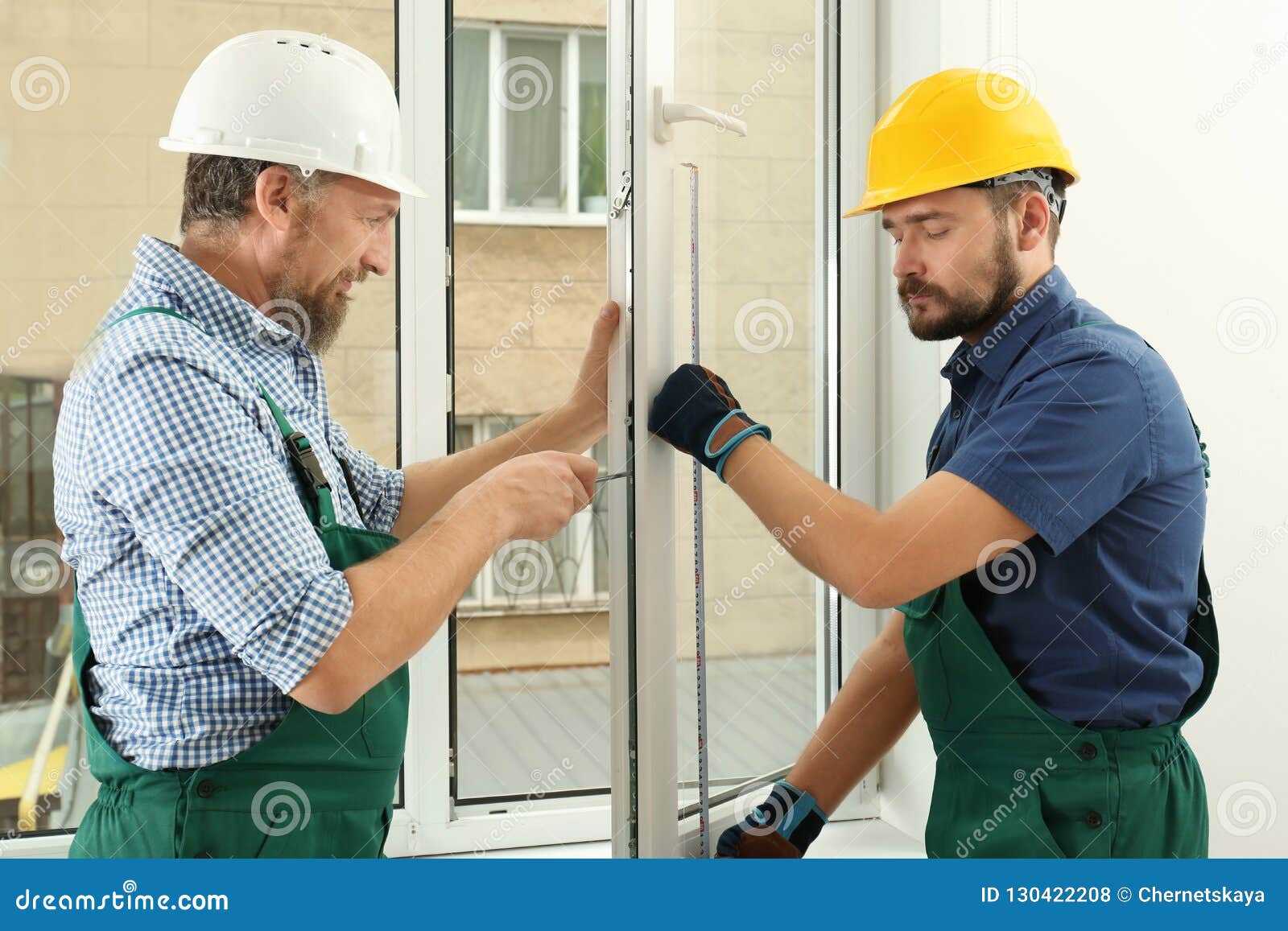 Construction Workers Installing New Window Stock Photo - Image of ...