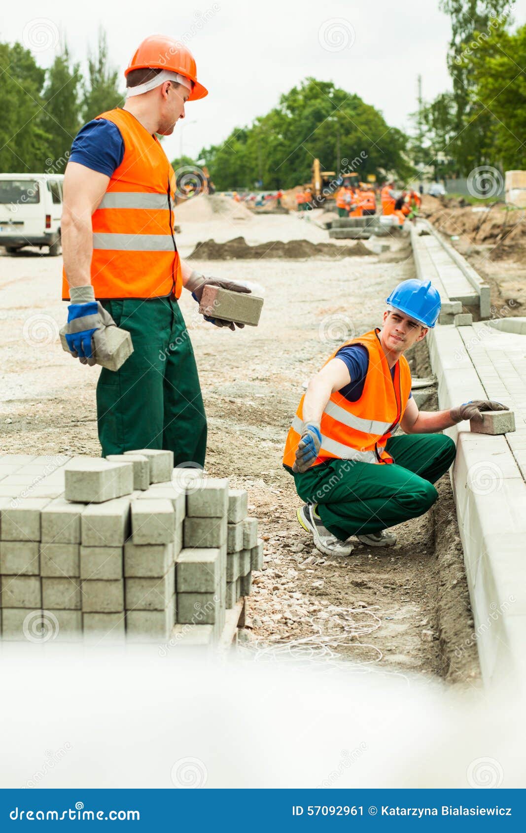 Construction Workers Installing Paving Stones Stock Image - Image of ...
