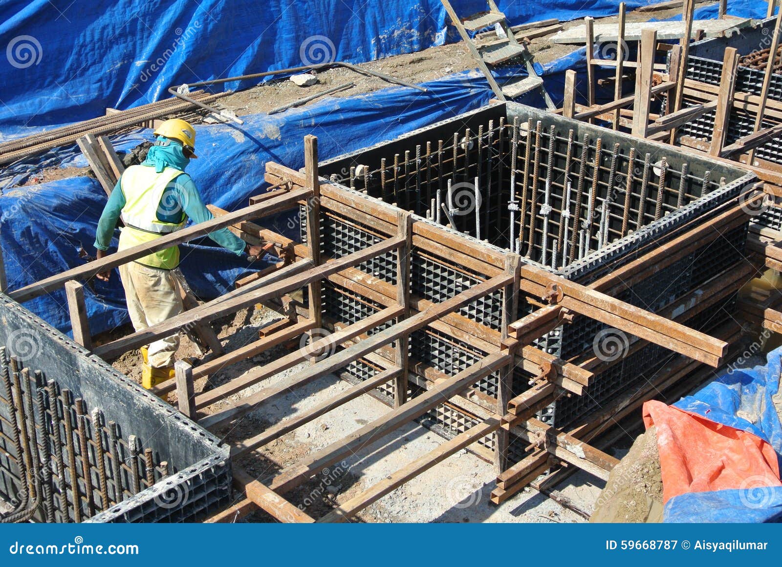 Construction Workers Installing Pile Cap Formwork Made from Polymer at ...