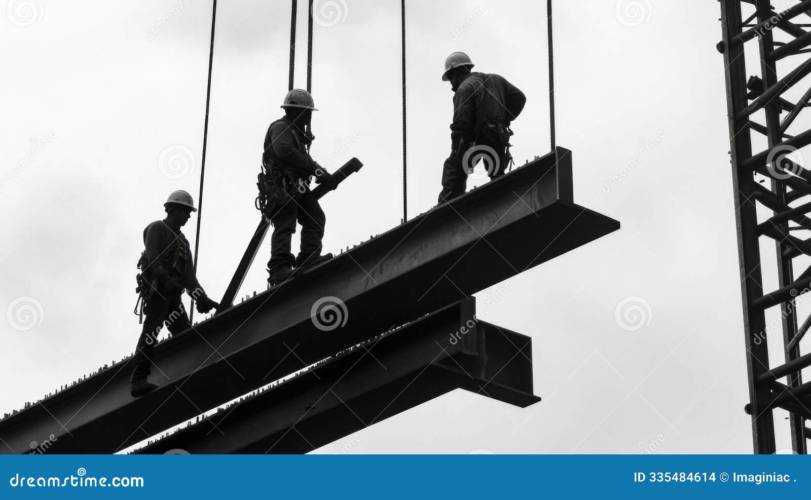 Construction Workers Installing Steel Beams on a Building Stock ...