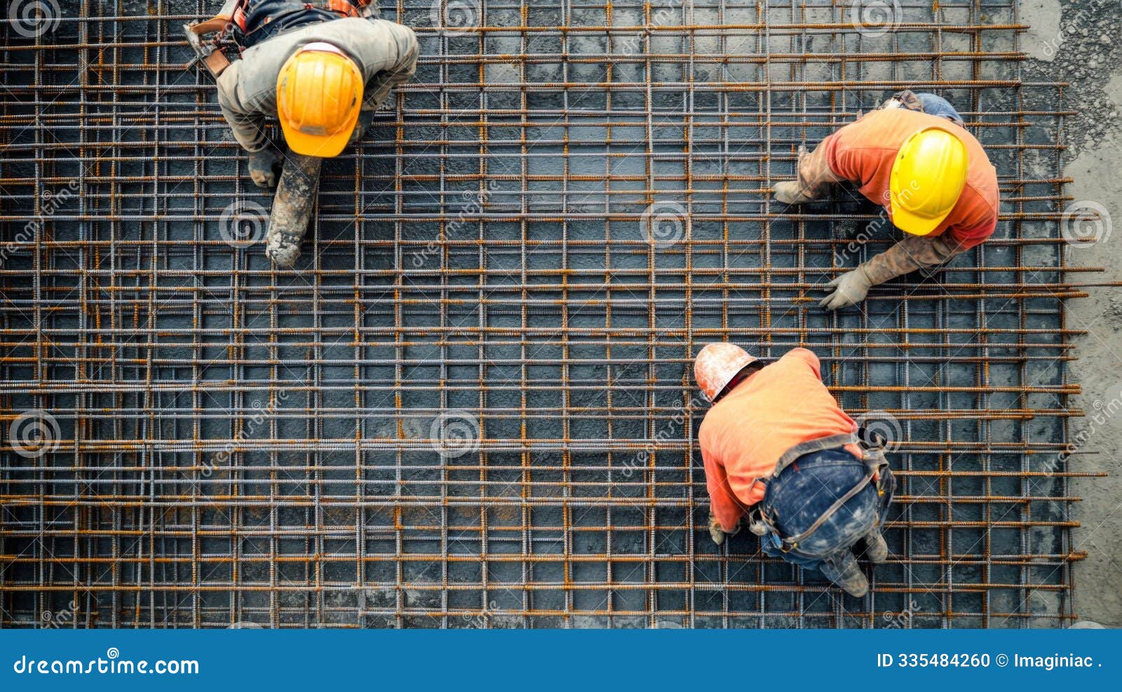 Construction Workers Installing Steel Reinforcing Mesh on Concrete ...