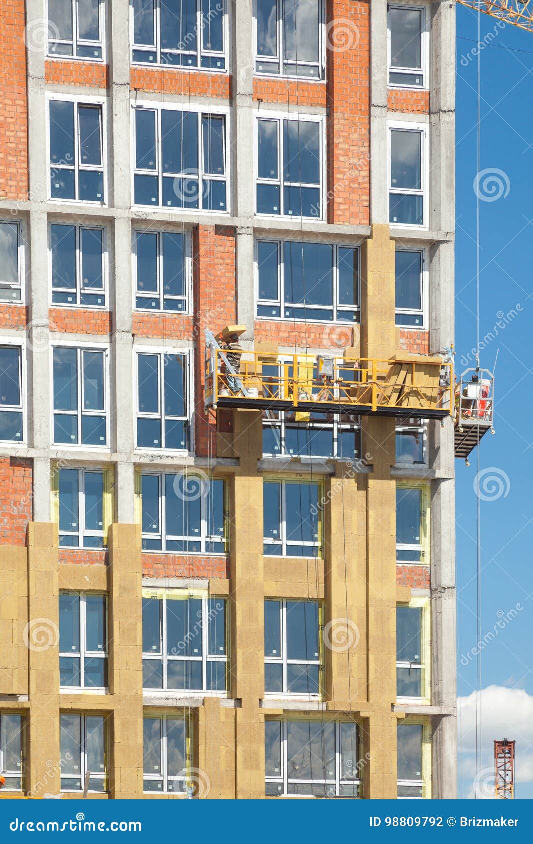 Construction Workers Insulating House Facade With Mineral Rock Wool ...