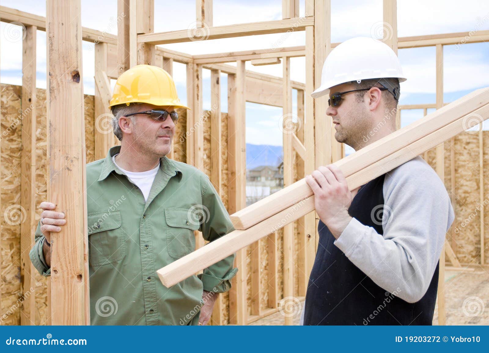 Construction Workers on the Job Building a Home Stock Photo - Image of ...