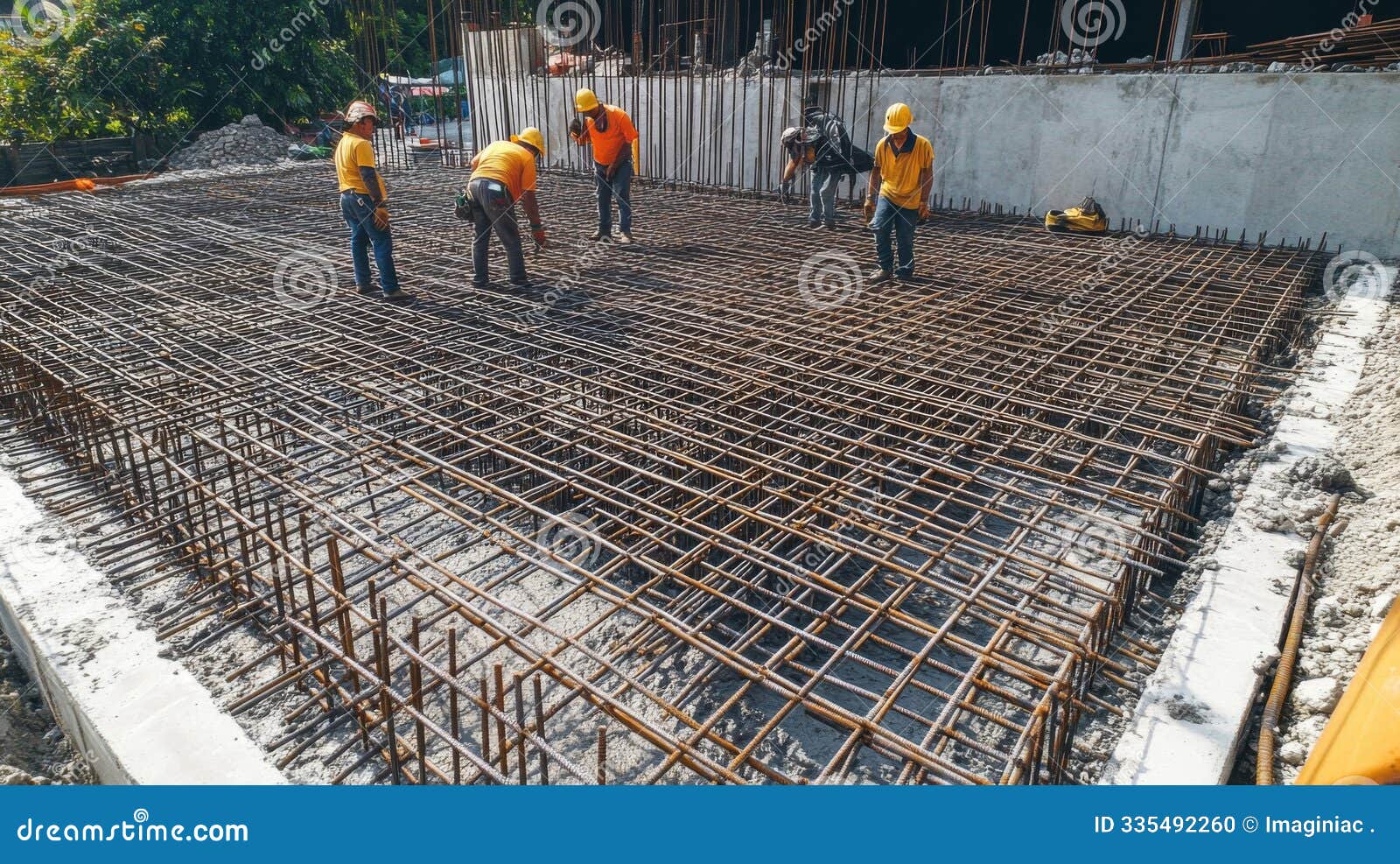 Construction Workers Laying Rebar Grid for Concrete Foundation Stock ...