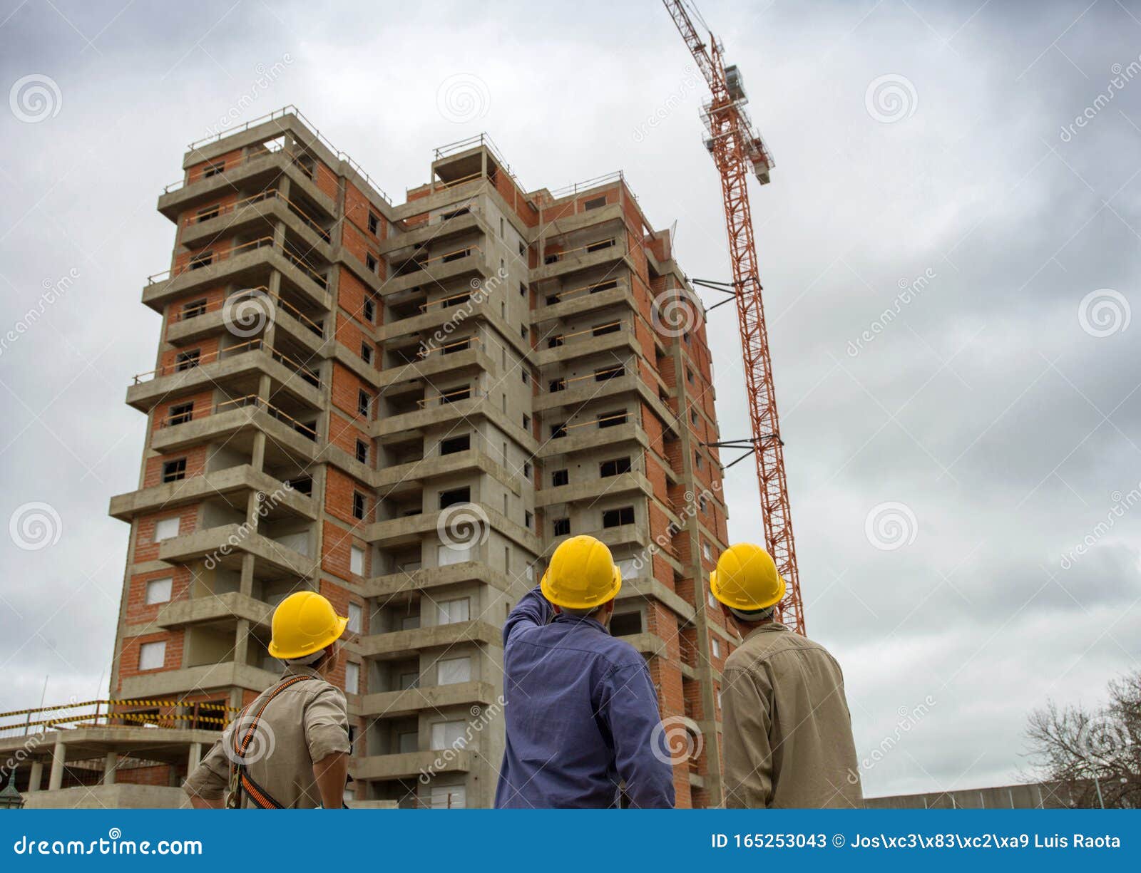 Construction Workers Observe and Inspect the Building Stock Image ...